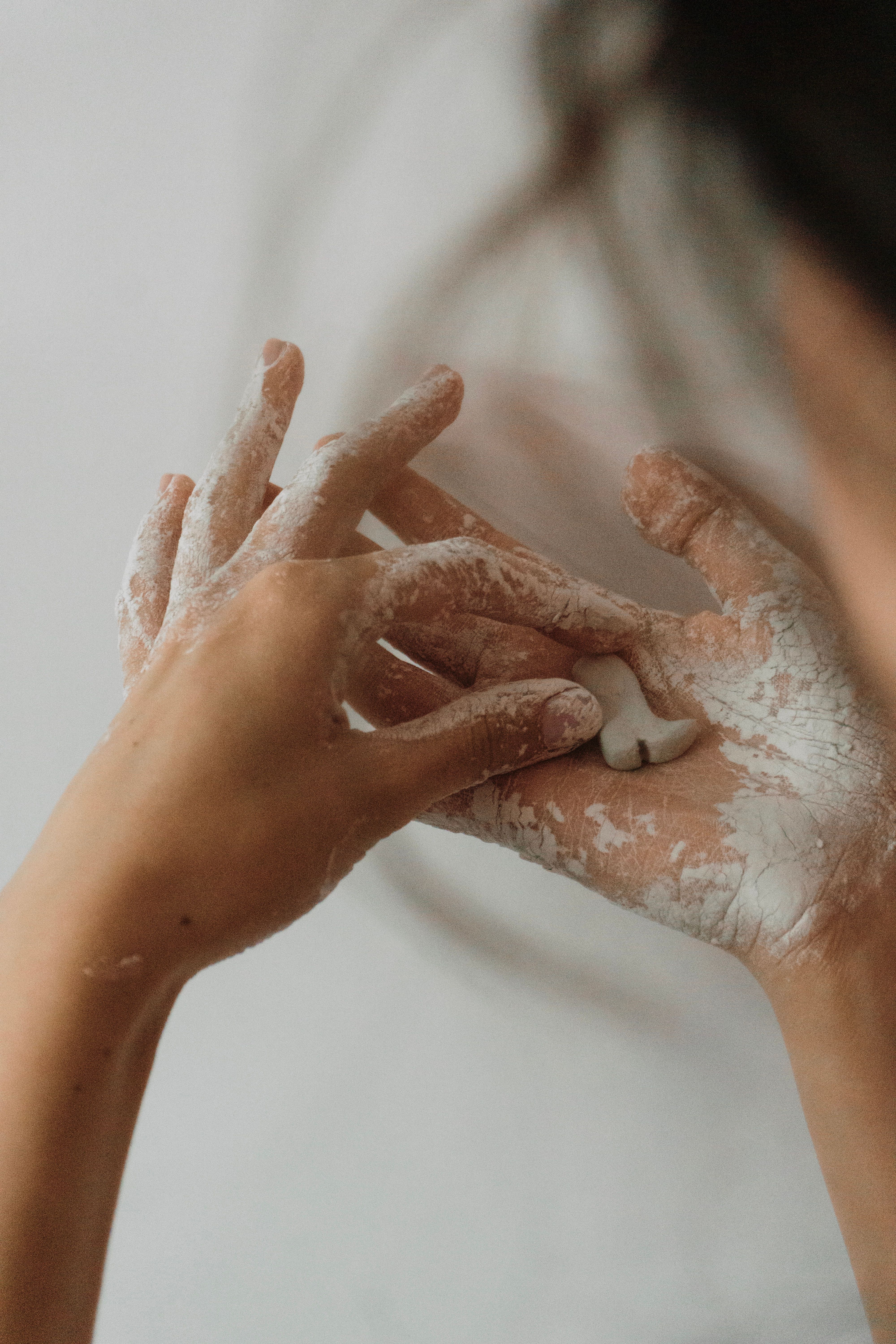 Close-up of a Person Making Small Clay Sculptures · Free Stock Photo