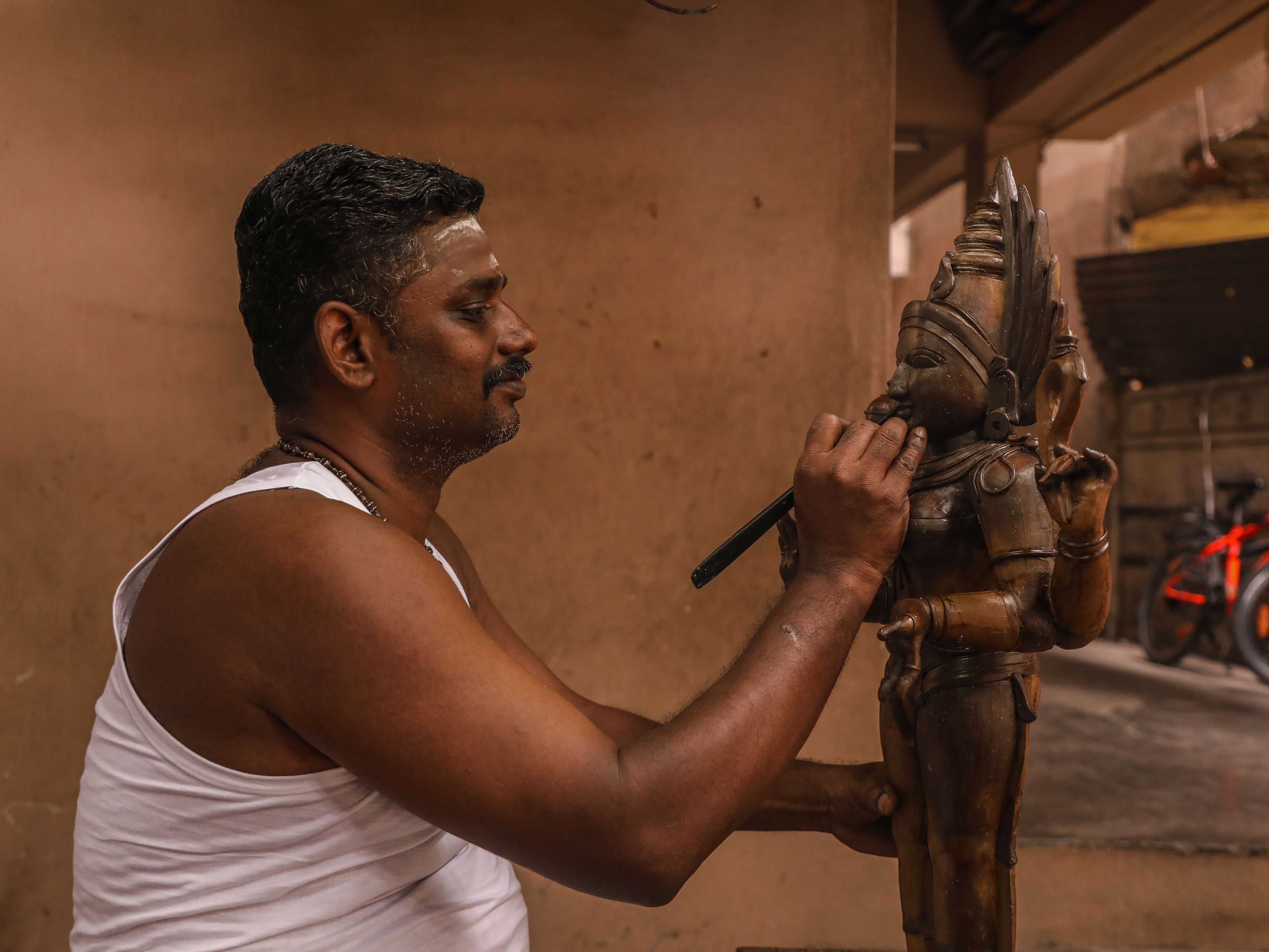 Man Making Wooden Figurine · Free Stock Photo