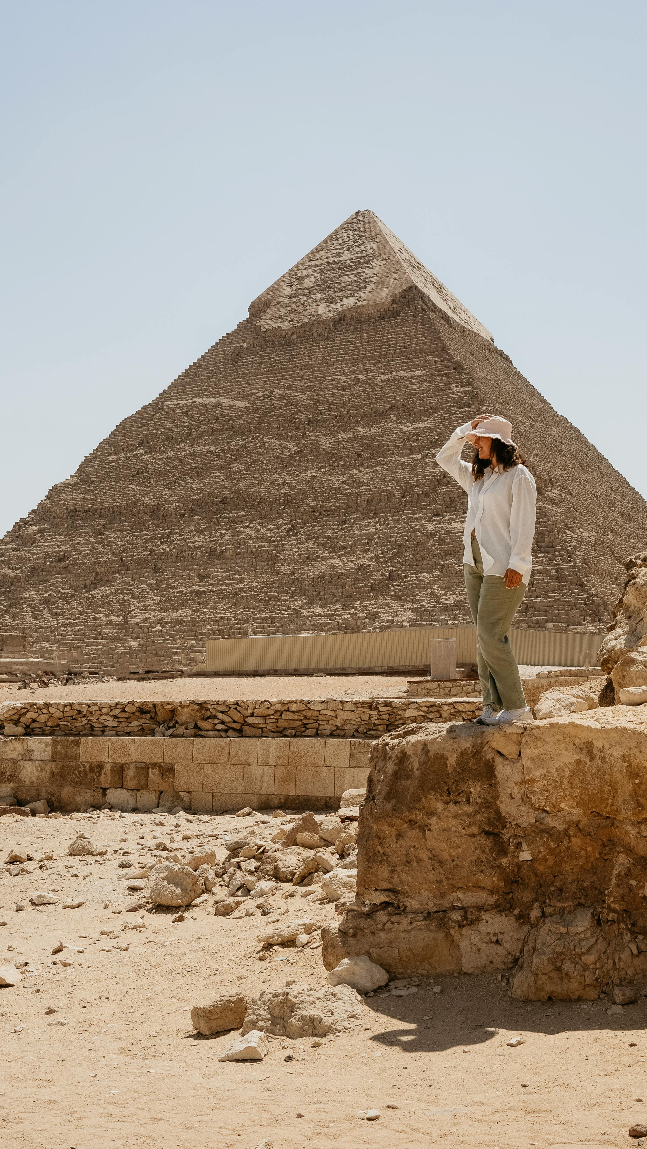 Woman Standing near Pyramid in Giza · Free Stock Photo