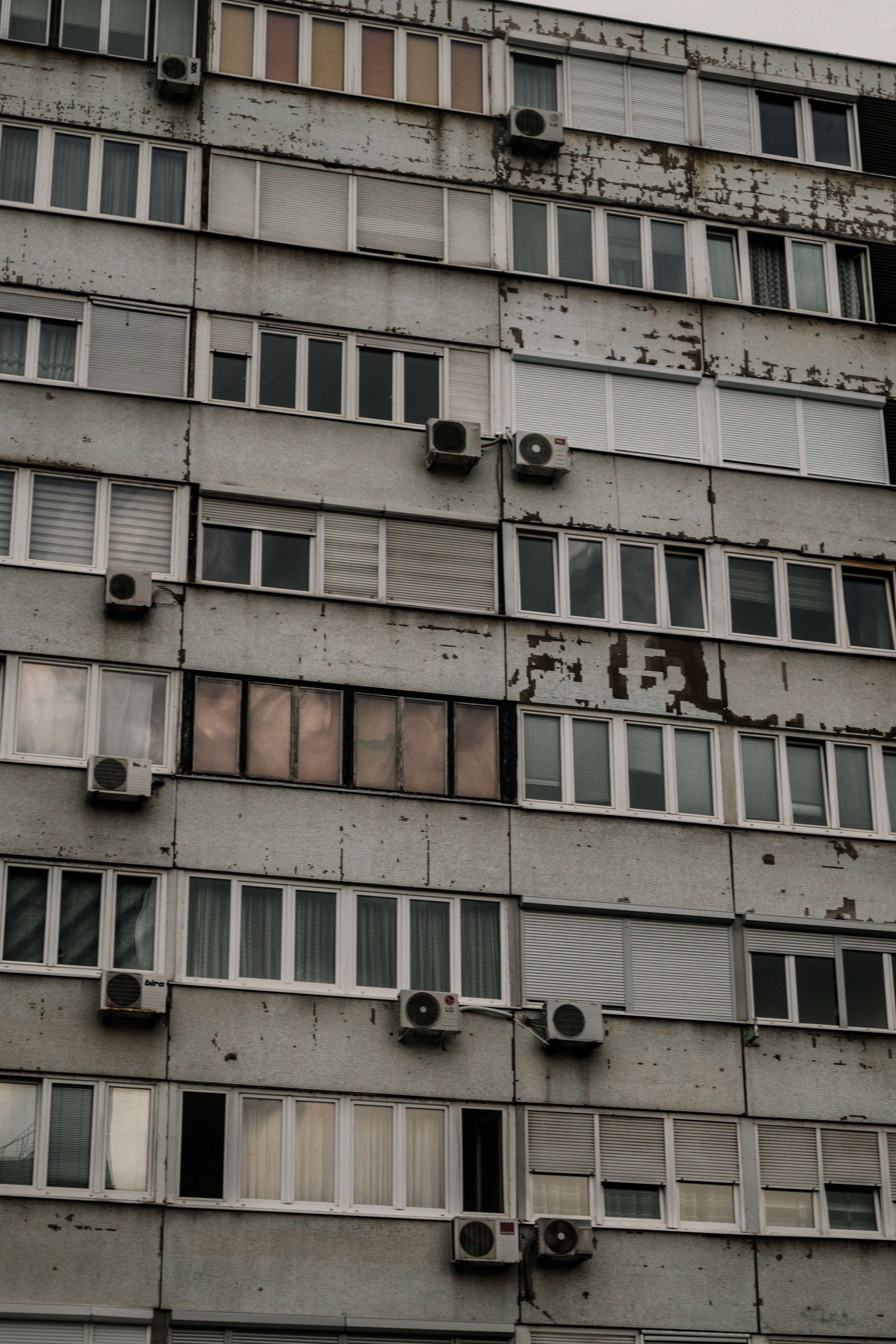 Facade of Scratched Residential Building · Free Stock Photo