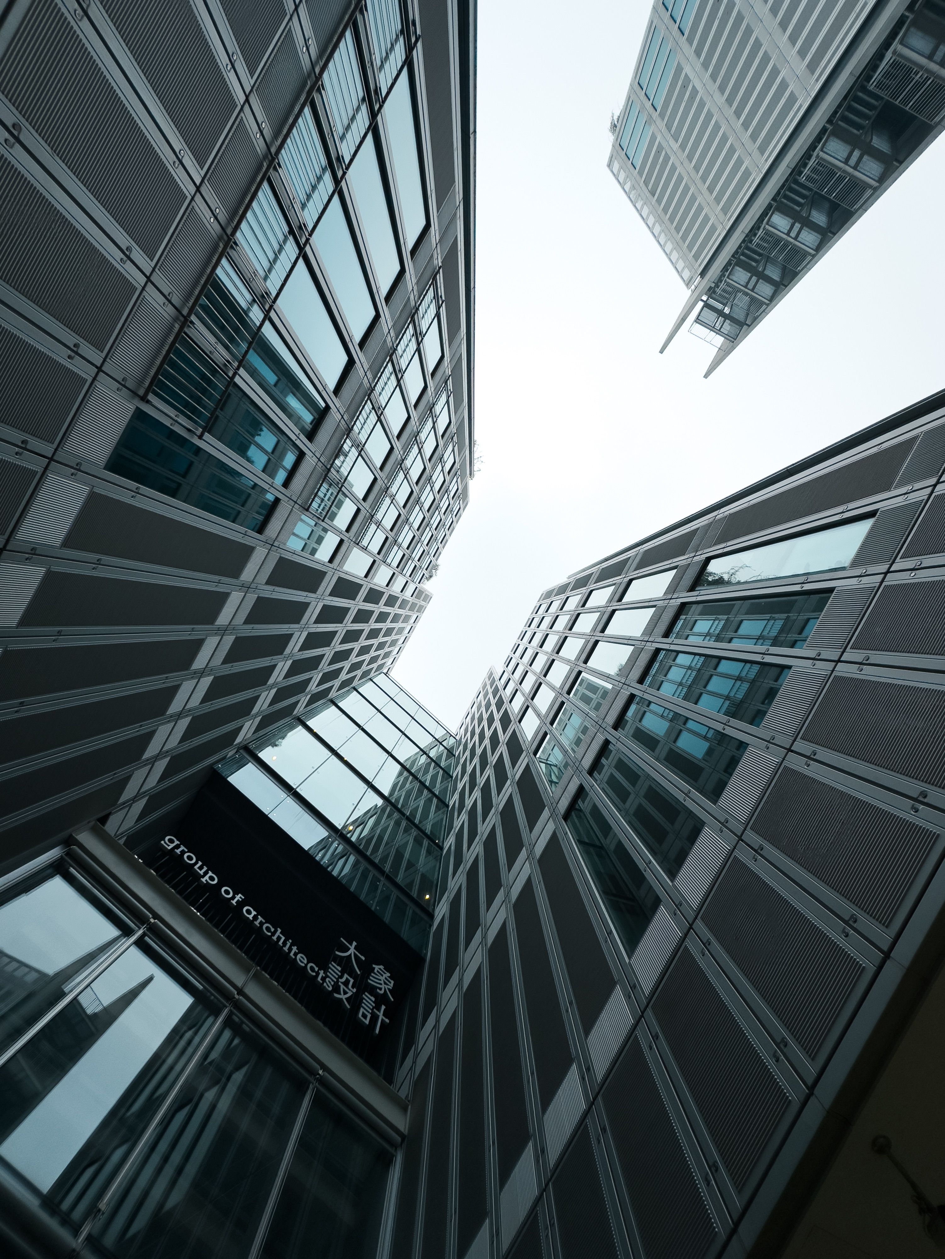 Low Angle Shot of Modern Skyscrapers in a City · Free Stock Photo