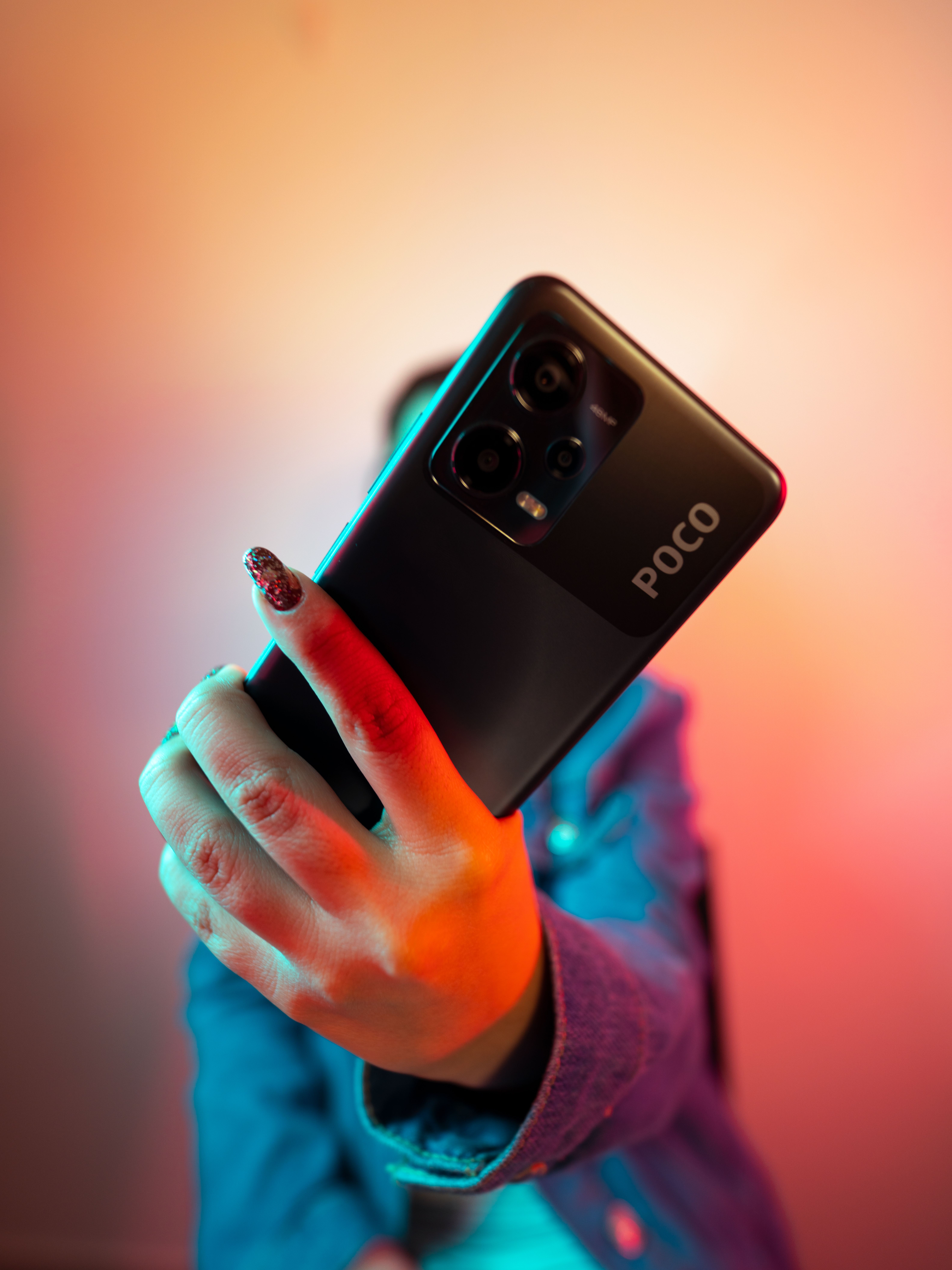 POCO Smartphone in Hand · Free Stock Photo
