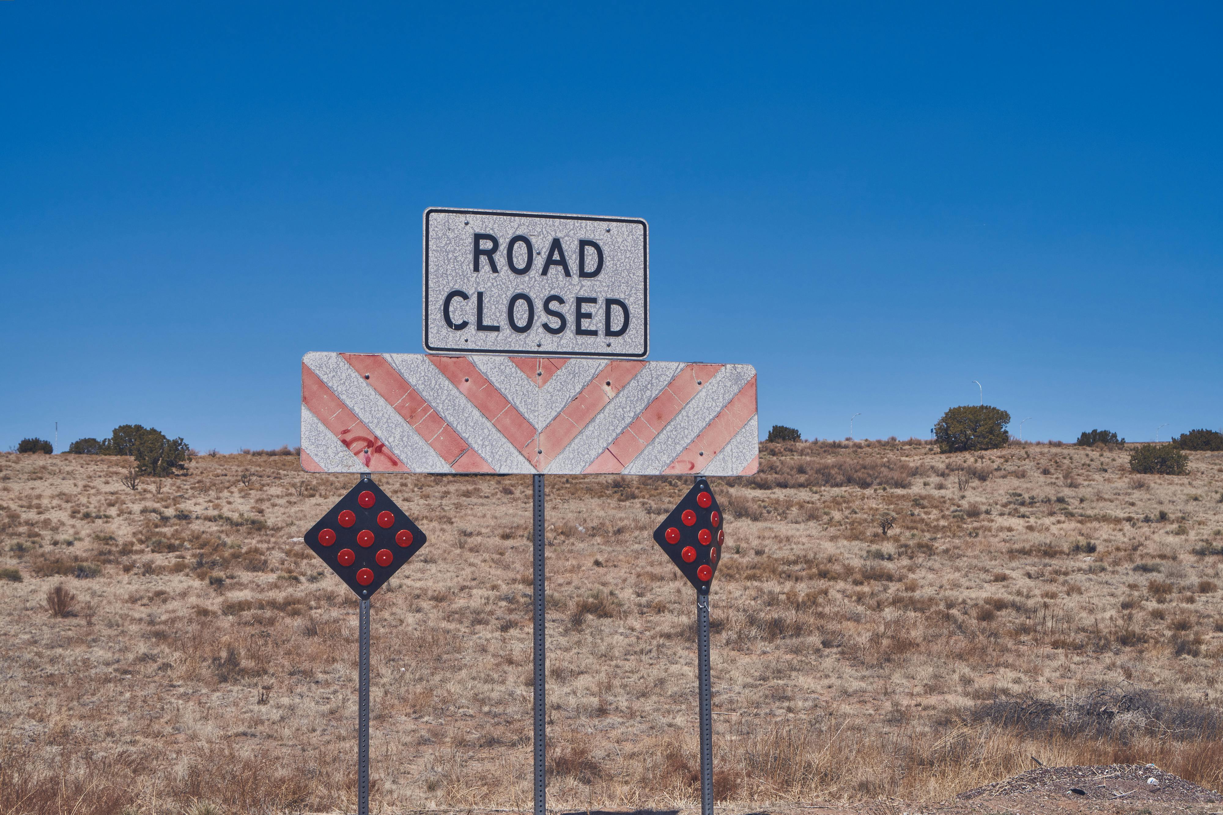 Old Signs on a Closed Road · Free Stock Photo