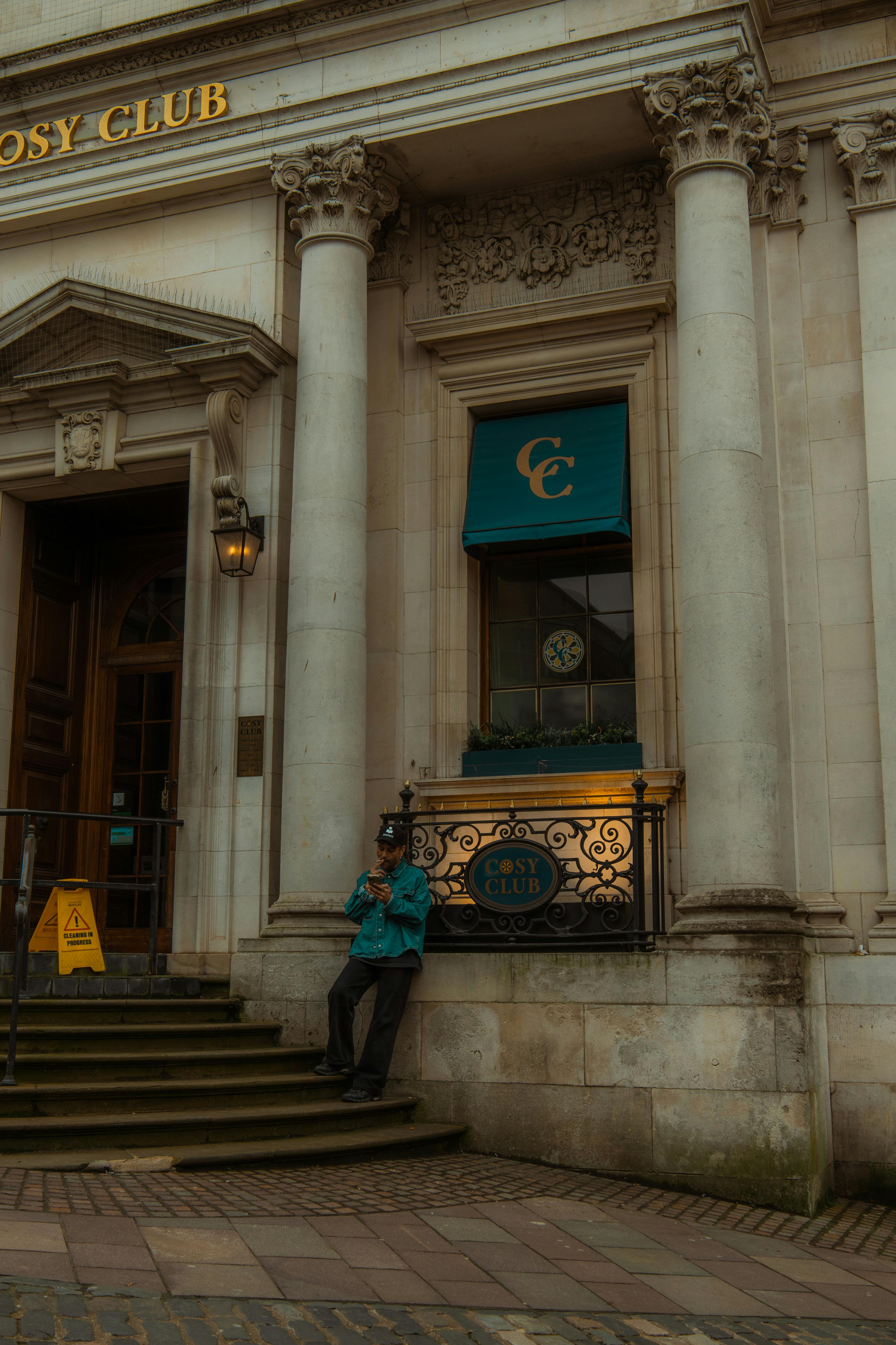 Person Standing in Front of a Fancy Building · Free Stock Photo