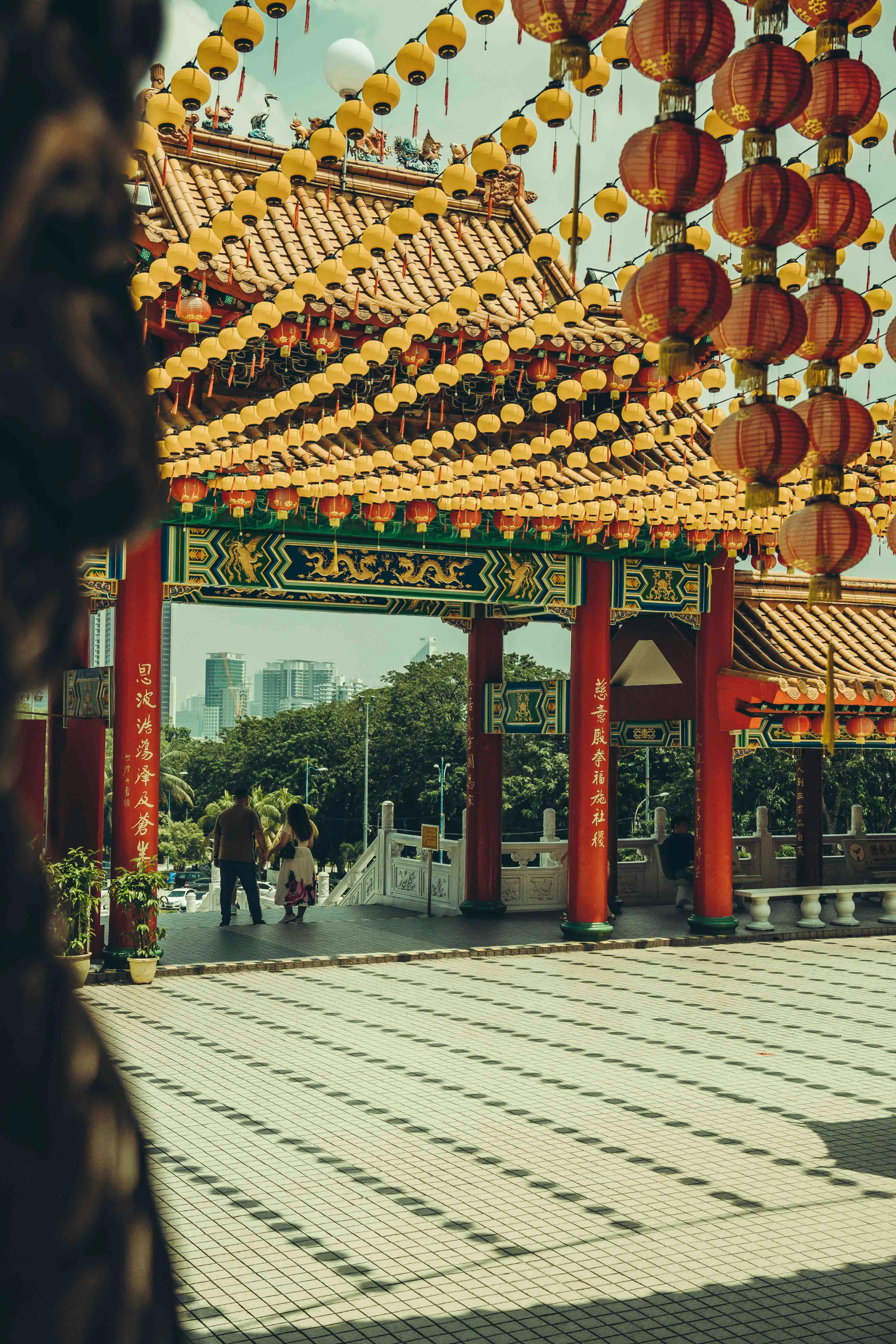 Traditional Asian Courtyard with People and Decorations · Free Stock Photo