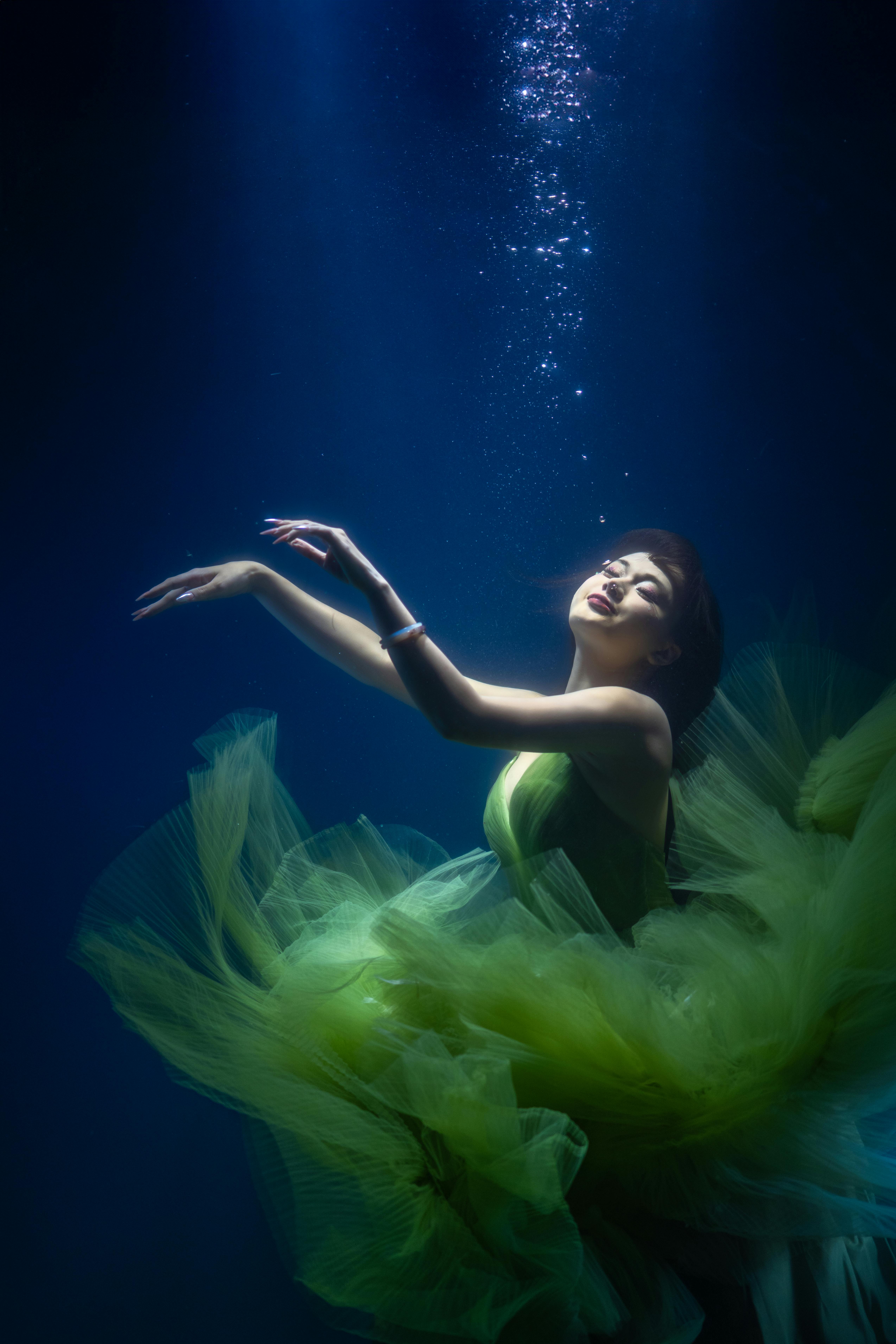 Woman Diving in Dress · Free Stock Photo