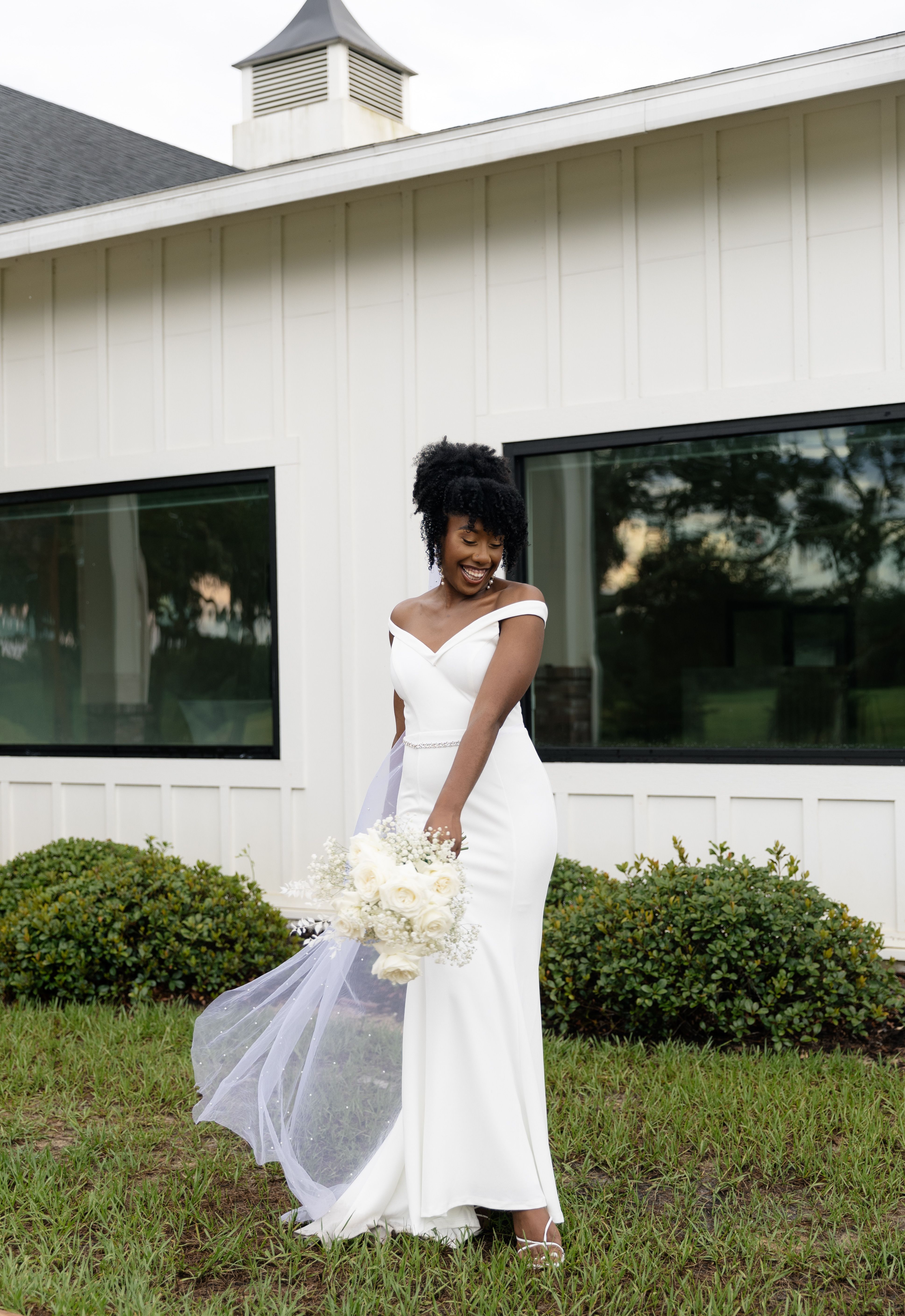 Cheerful Bride Standing in Yard · Free Stock Photo