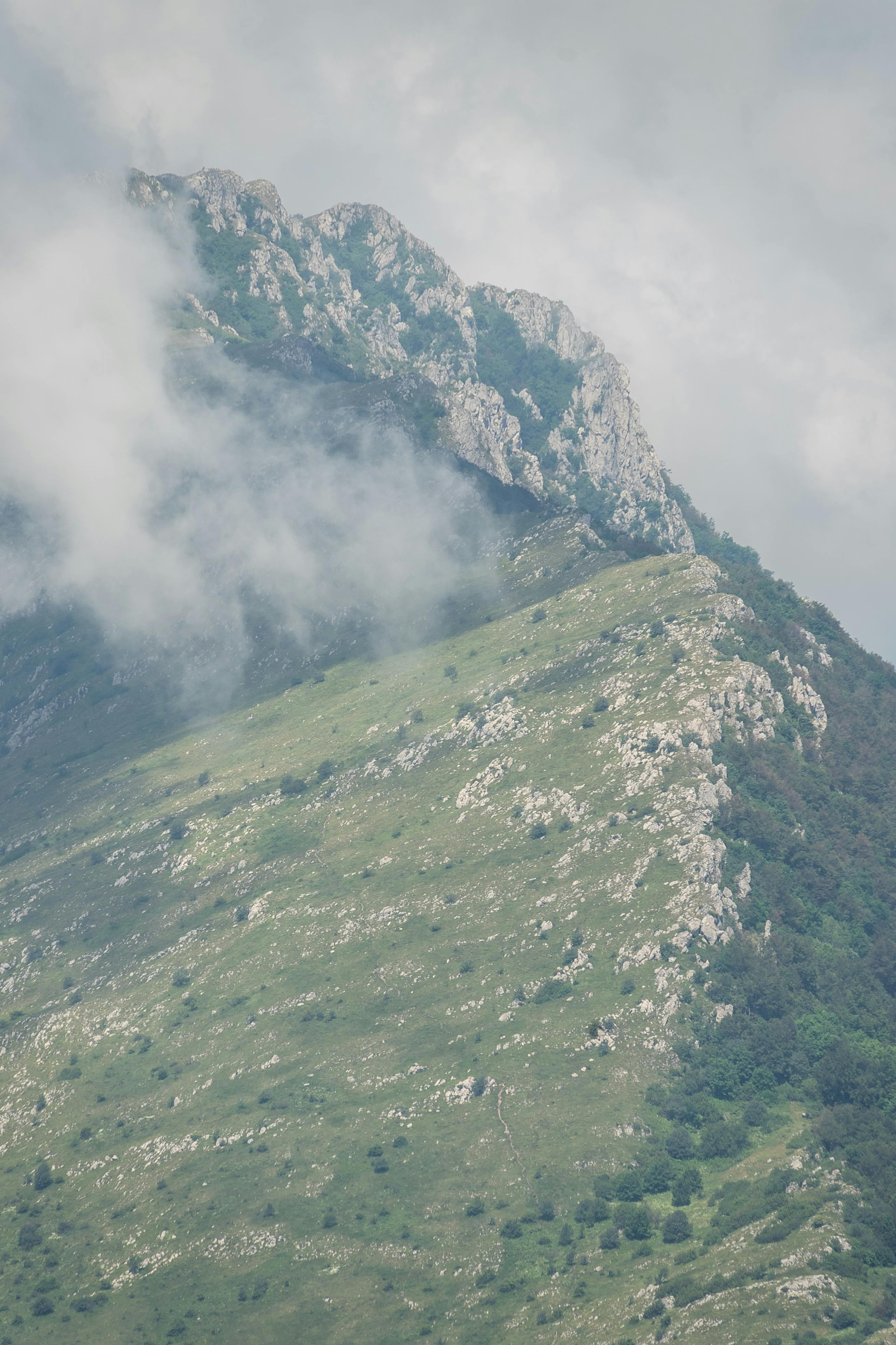 Aerial View of a Mountain Peak · Free Stock Photo