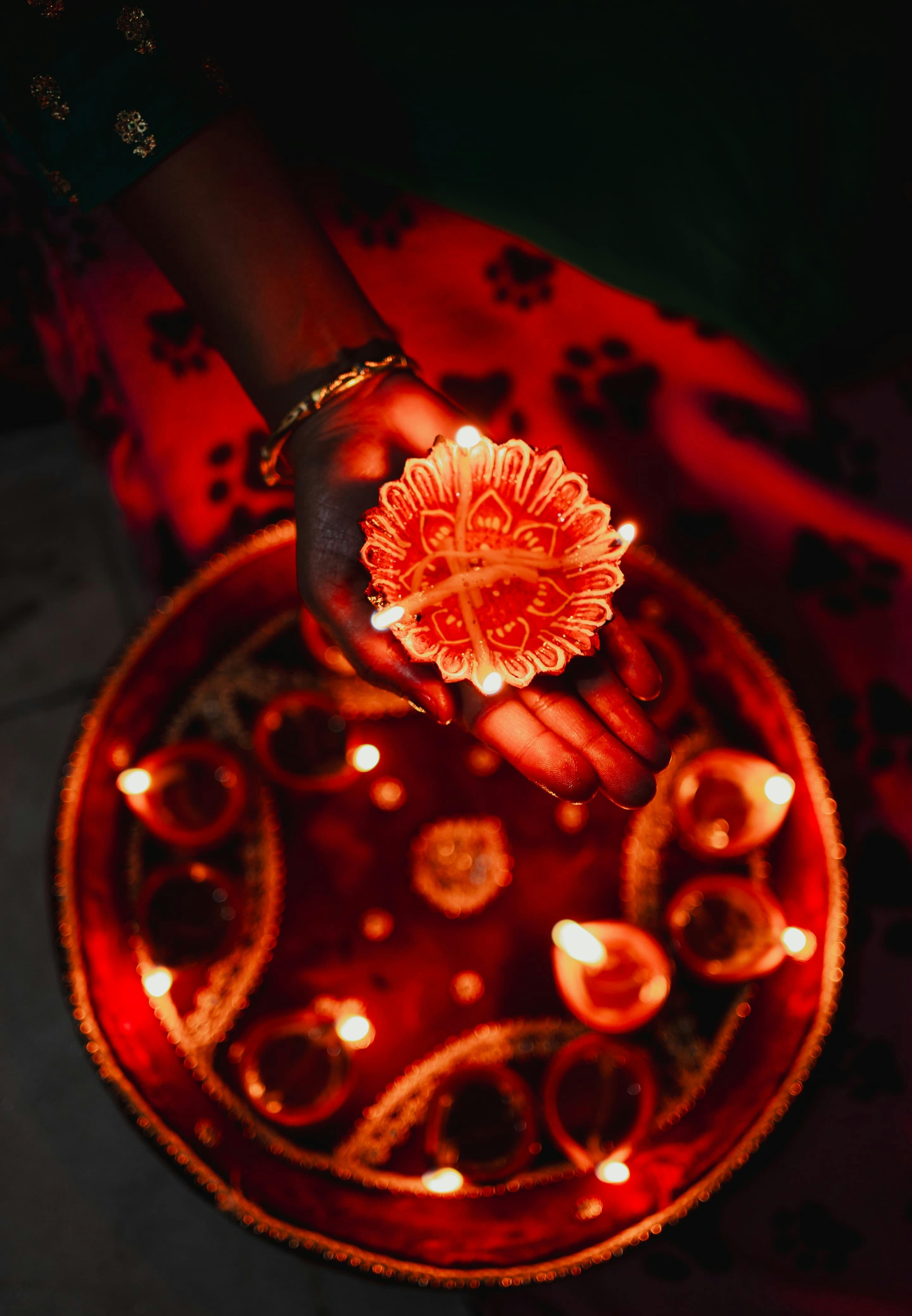 South Asian Woman Celebrating Diwali with Traditional Lamp · Free Stock ...