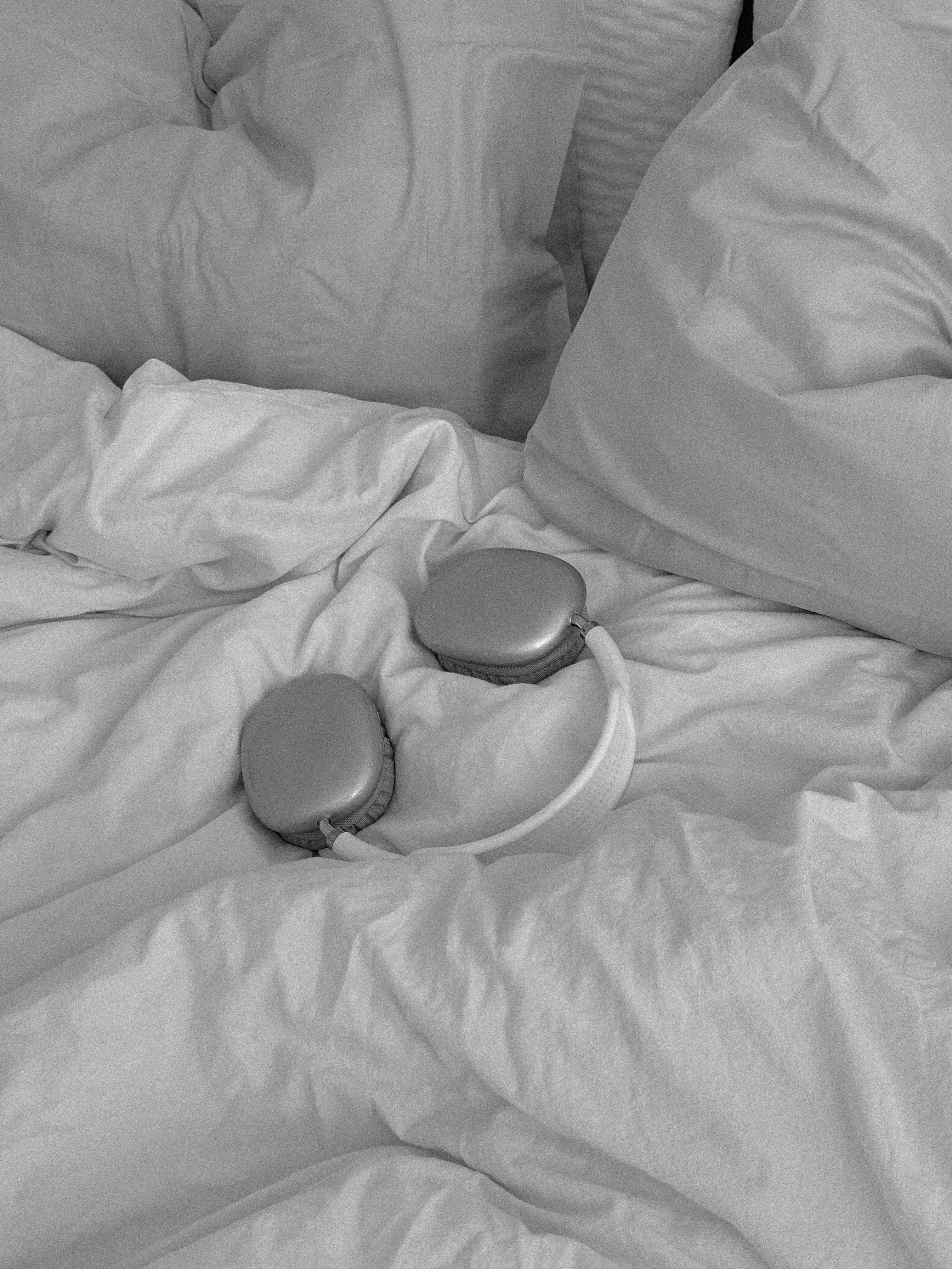 Headphones on Bed · Free Stock Photo