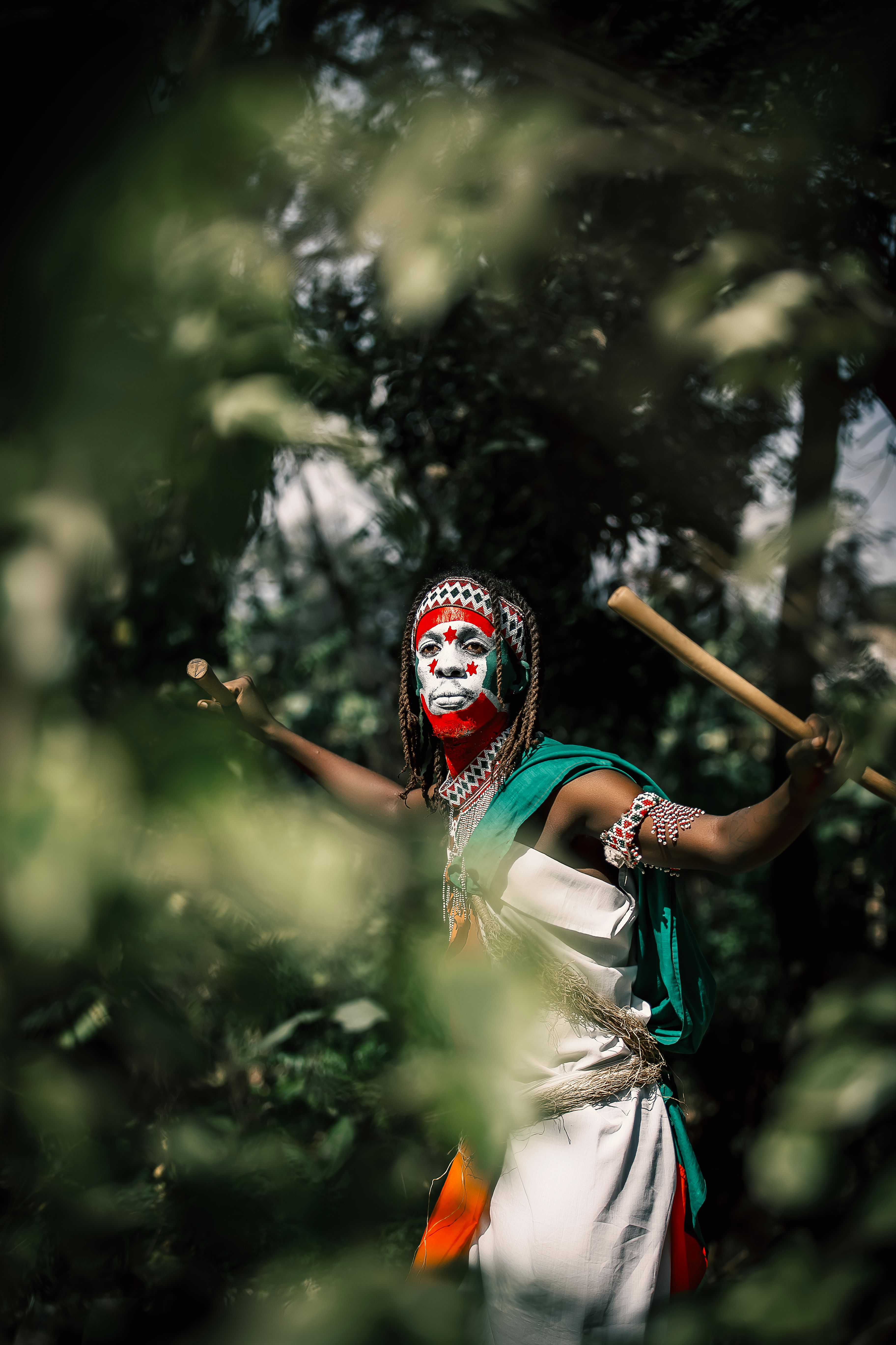 Burundian Man with Painted Face in Gown · Free Stock Photo