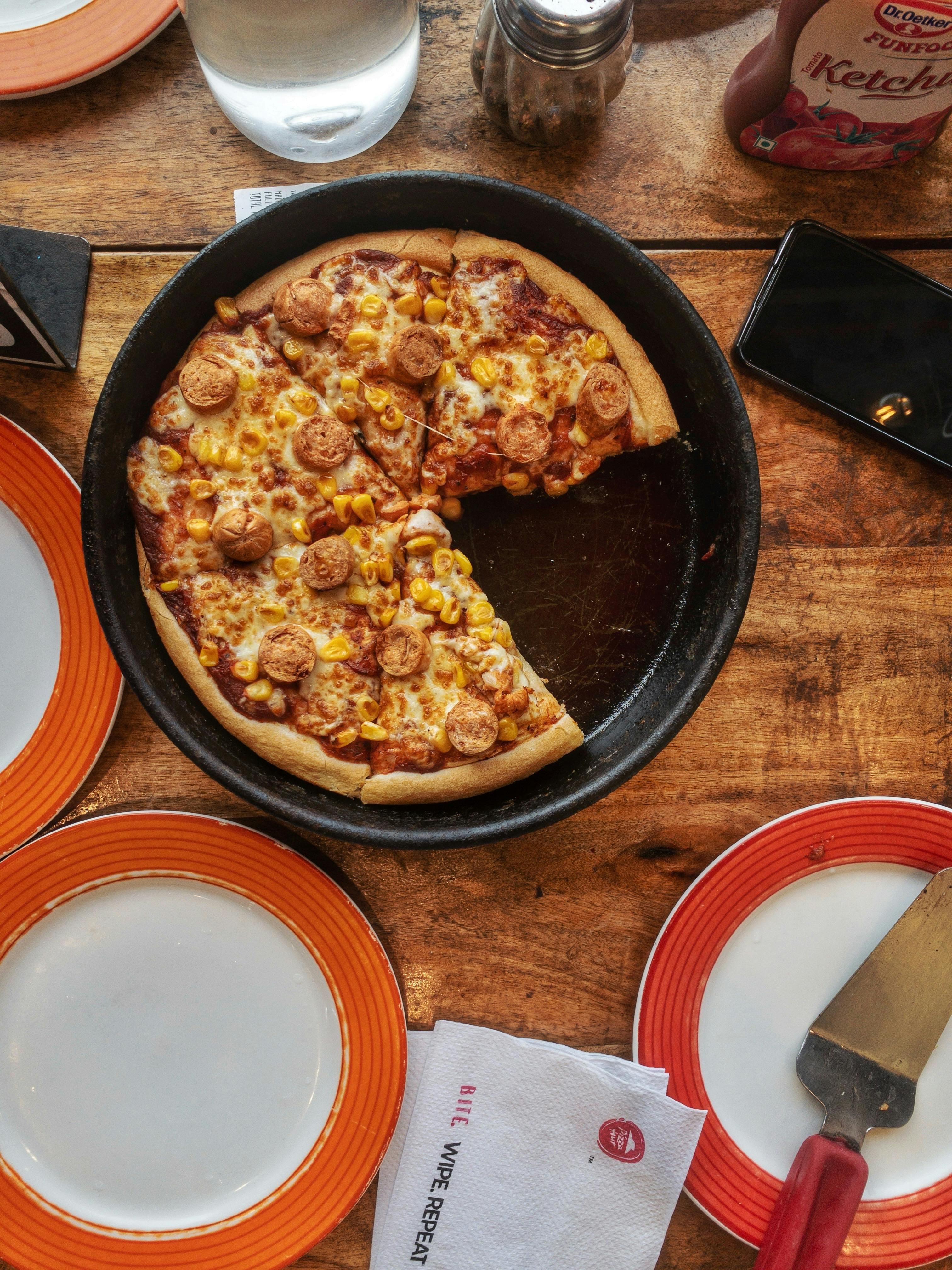 Pizza on Plate on Table · Free Stock Photo