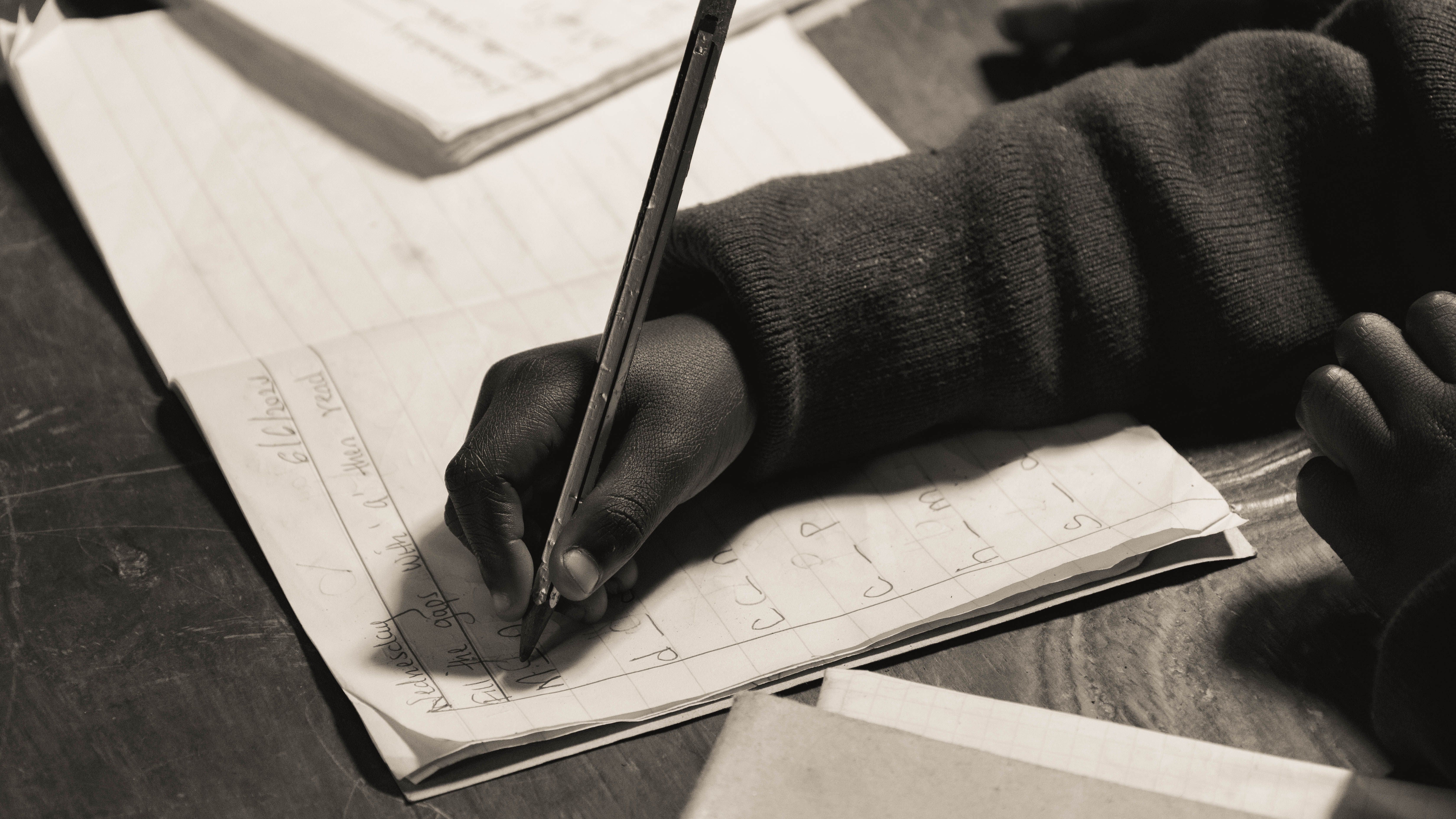 Pupil Writing in Notebook · Free Stock Photo