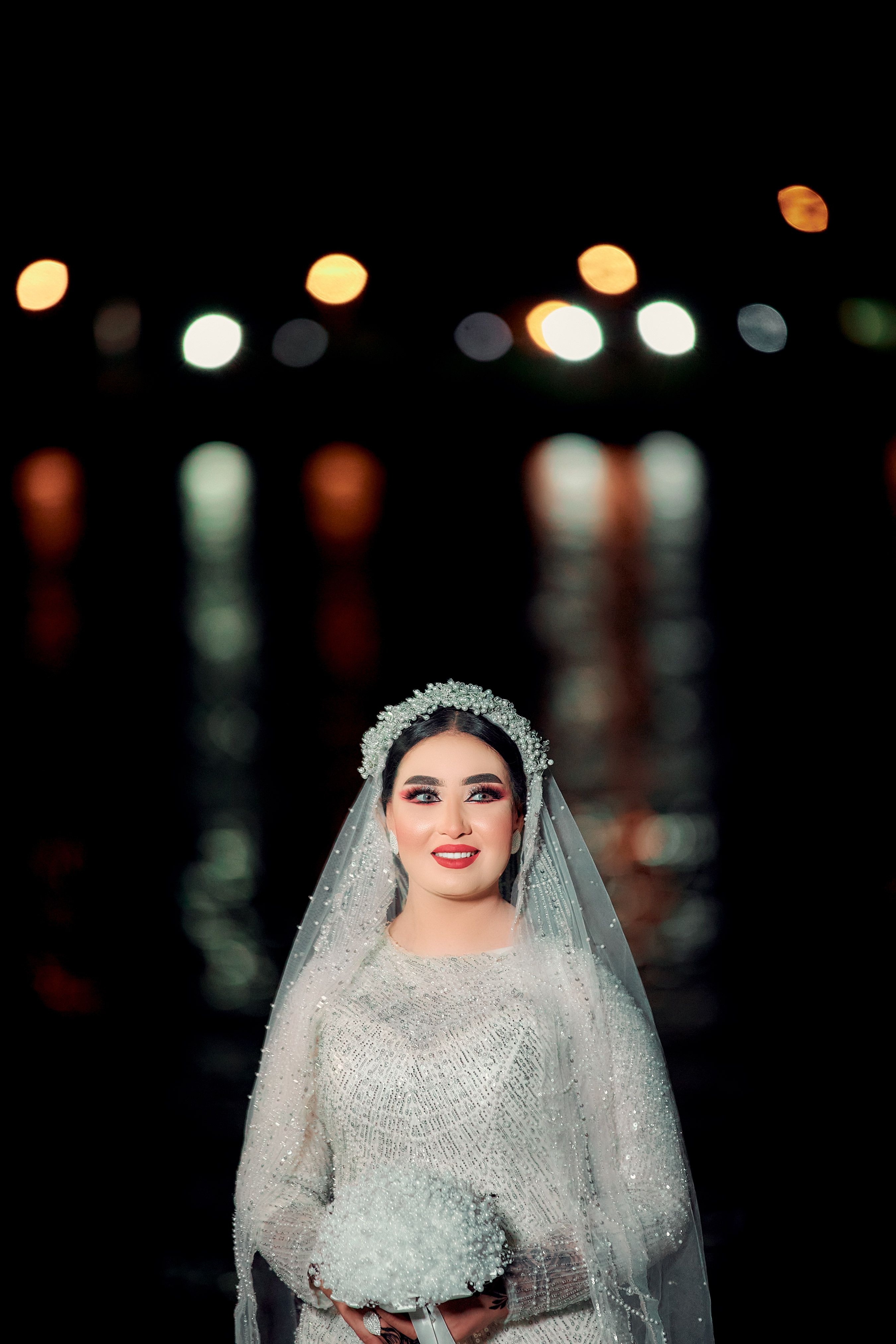 Smiling Bride in Wedding Dress at Night · Free Stock Photo