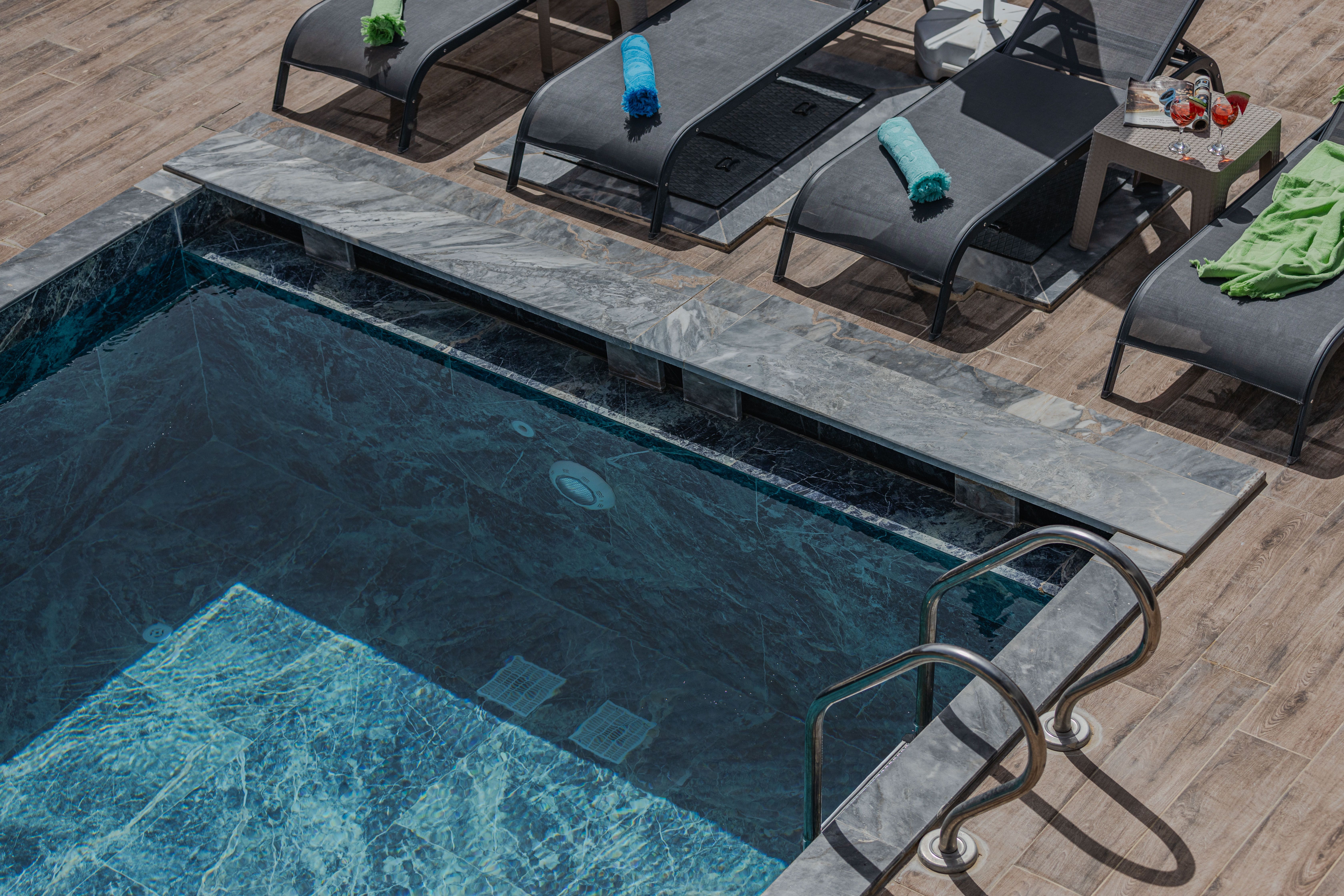 Pool With Gray Wooden Floors Around Photos, Download The BEST Free Pool ...