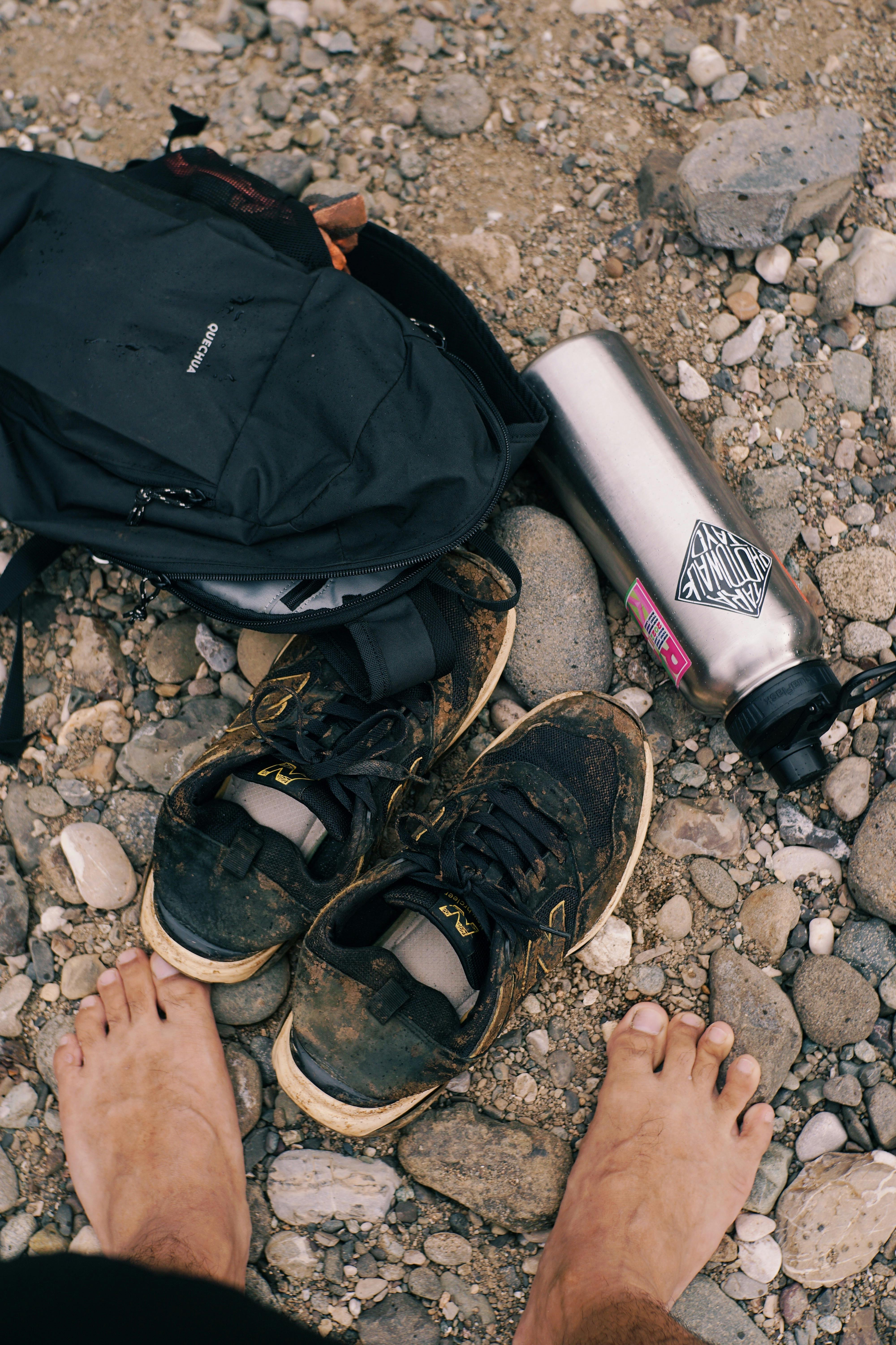 Backpack, Shoes and Feet of Standing Man · Free Stock Photo