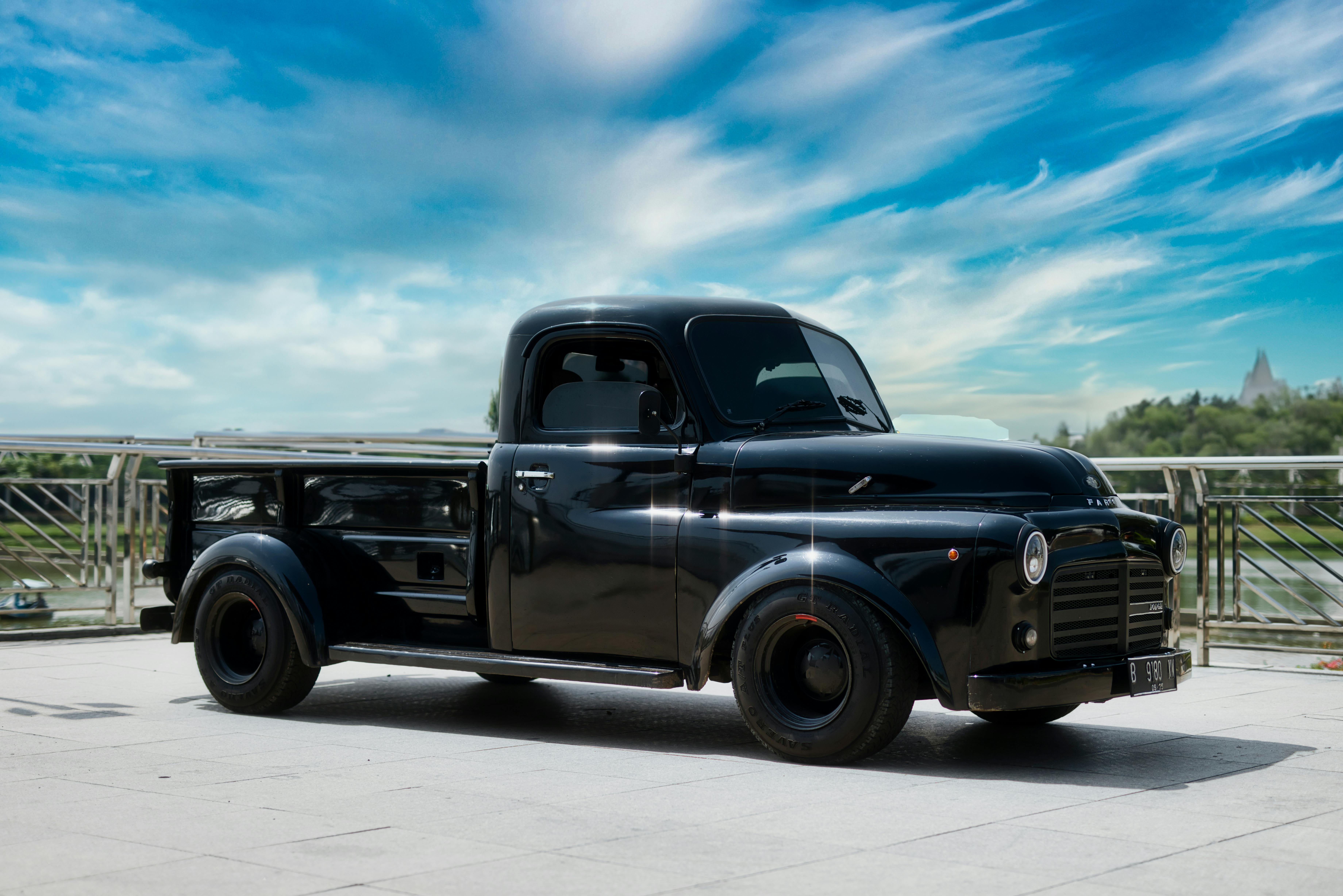 Side View of a Black Pick Up Truck · Free Stock Photo