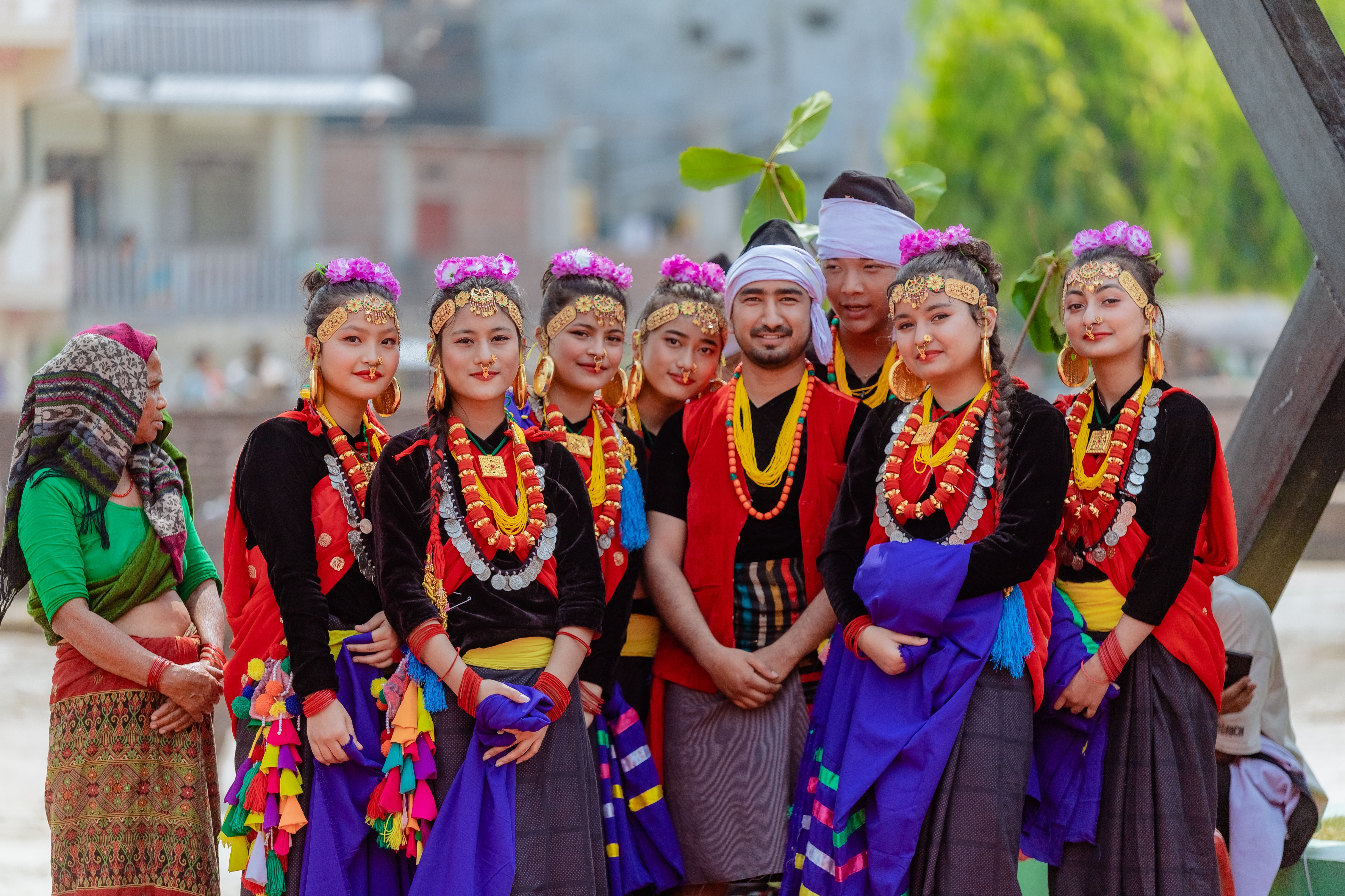Group of People Wearing Traditional Colorful Clothing Posing Together ...