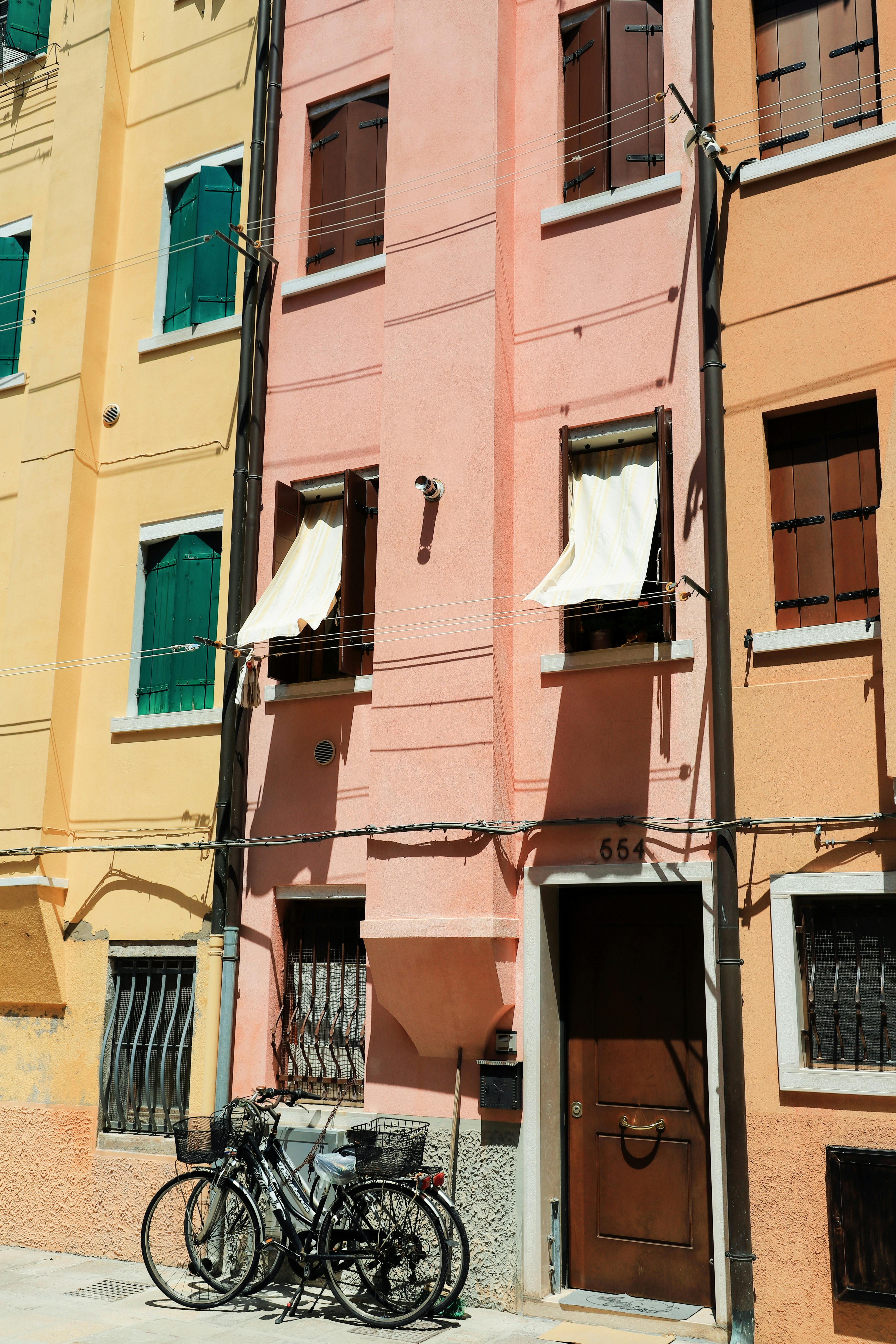Windows in a Tenement in Sunlight · Free Stock Photo
