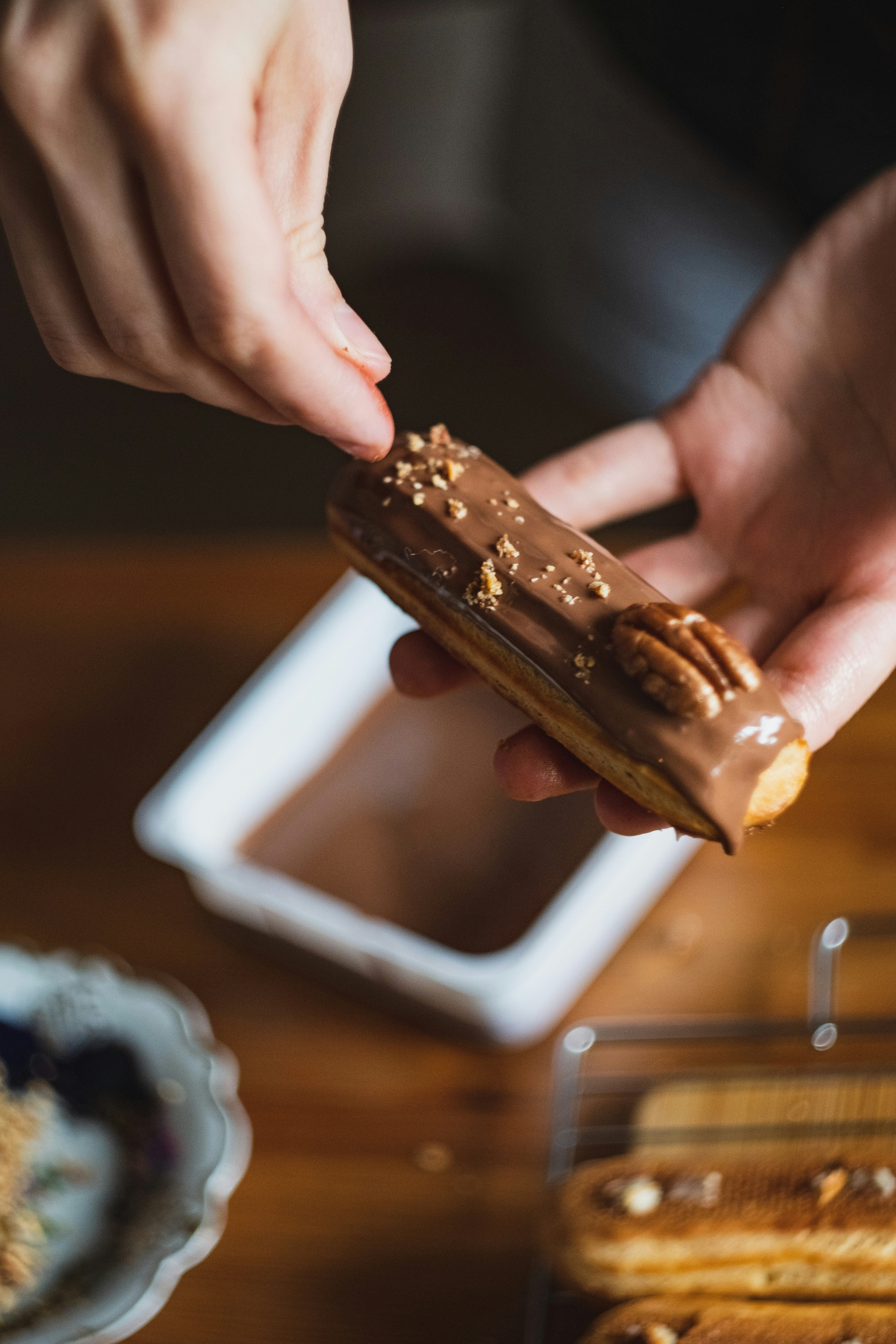 Person Hands Holding Sweet, Chocolate Cake · Free Stock Photo