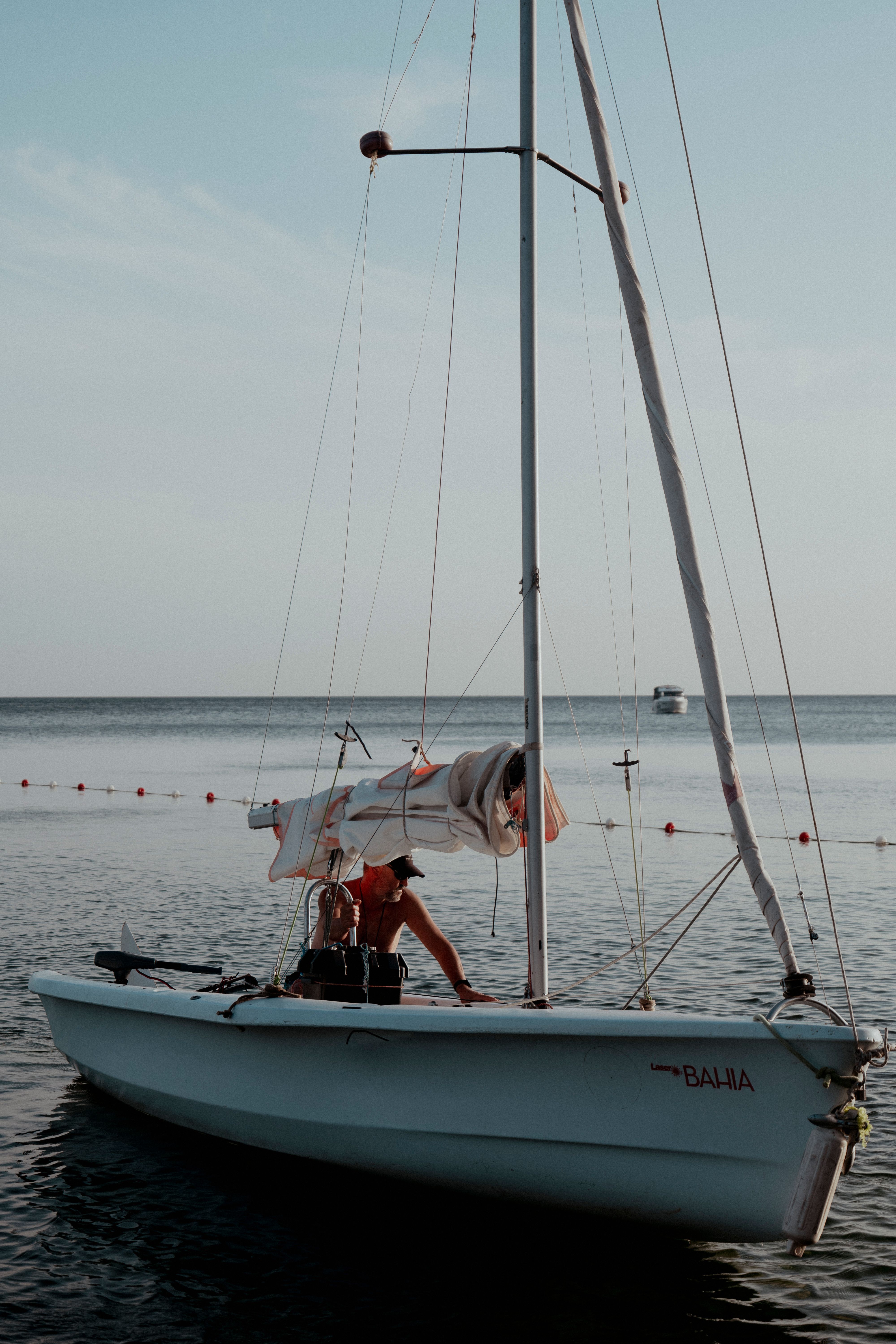 Sailor on Sailing on a Boat on the Sea · Free Stock Photo