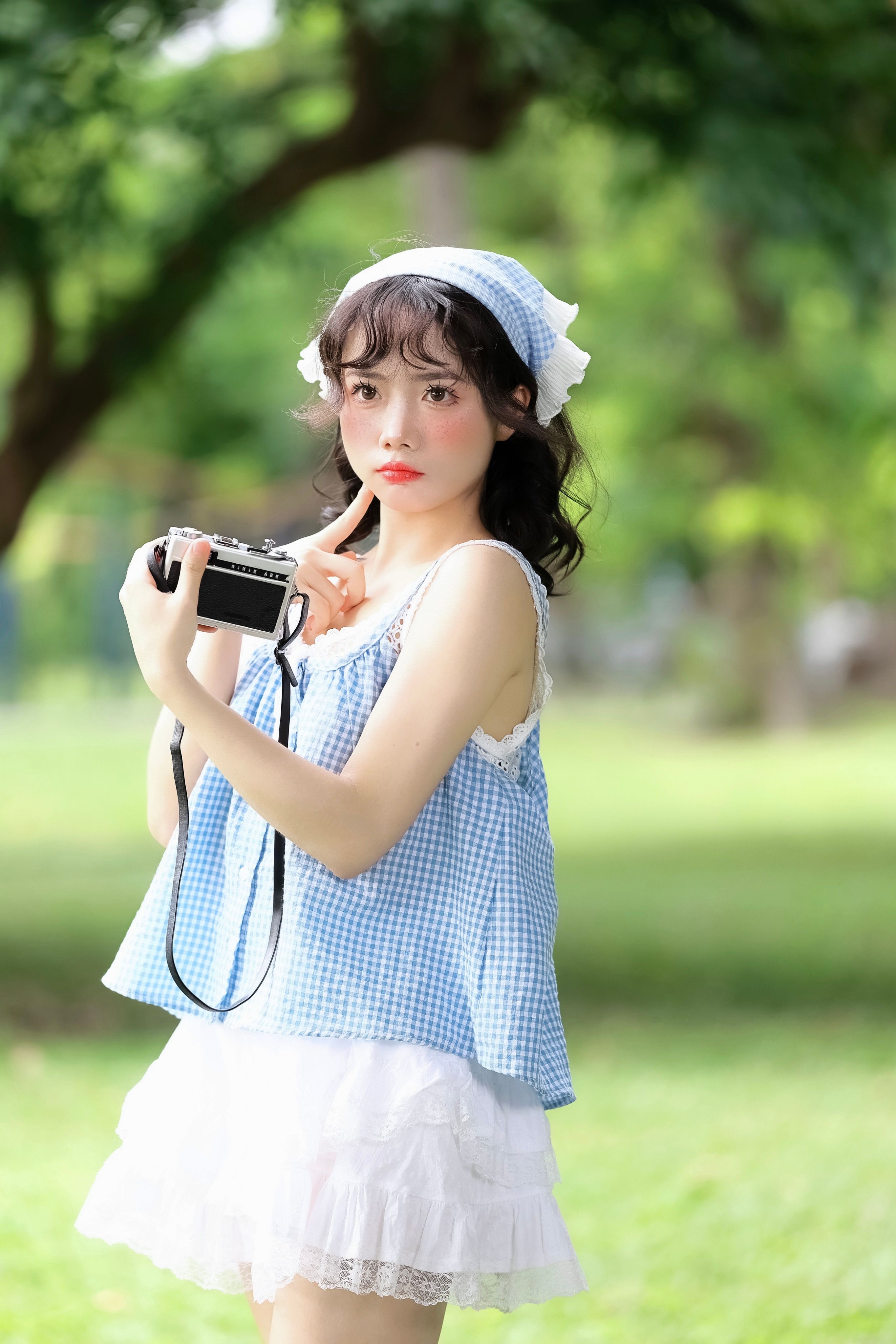 Portrait of Girl with Camera · Free Stock Photo