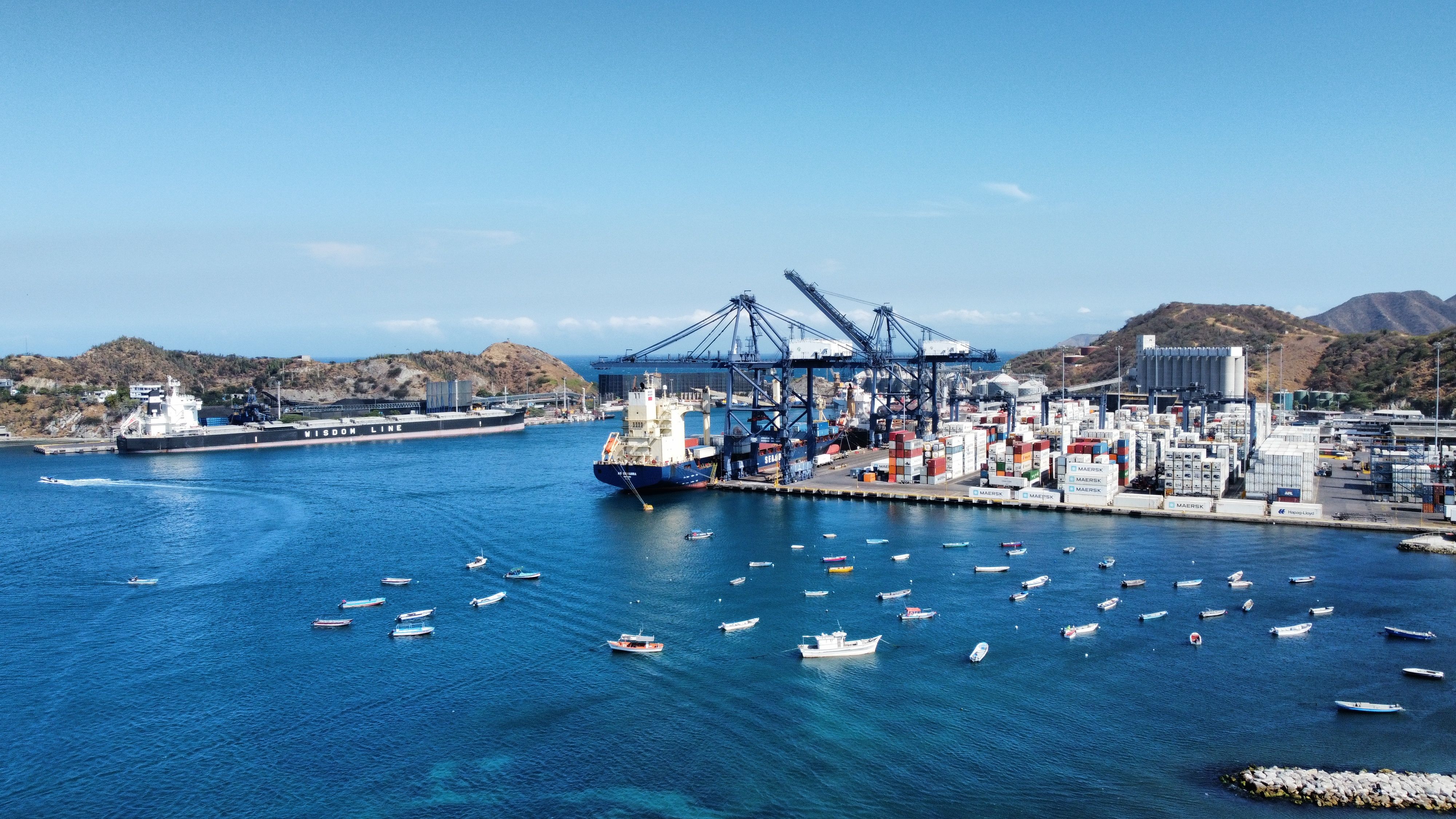 An aerial view of a port with boats and cargo · Free Stock Photo