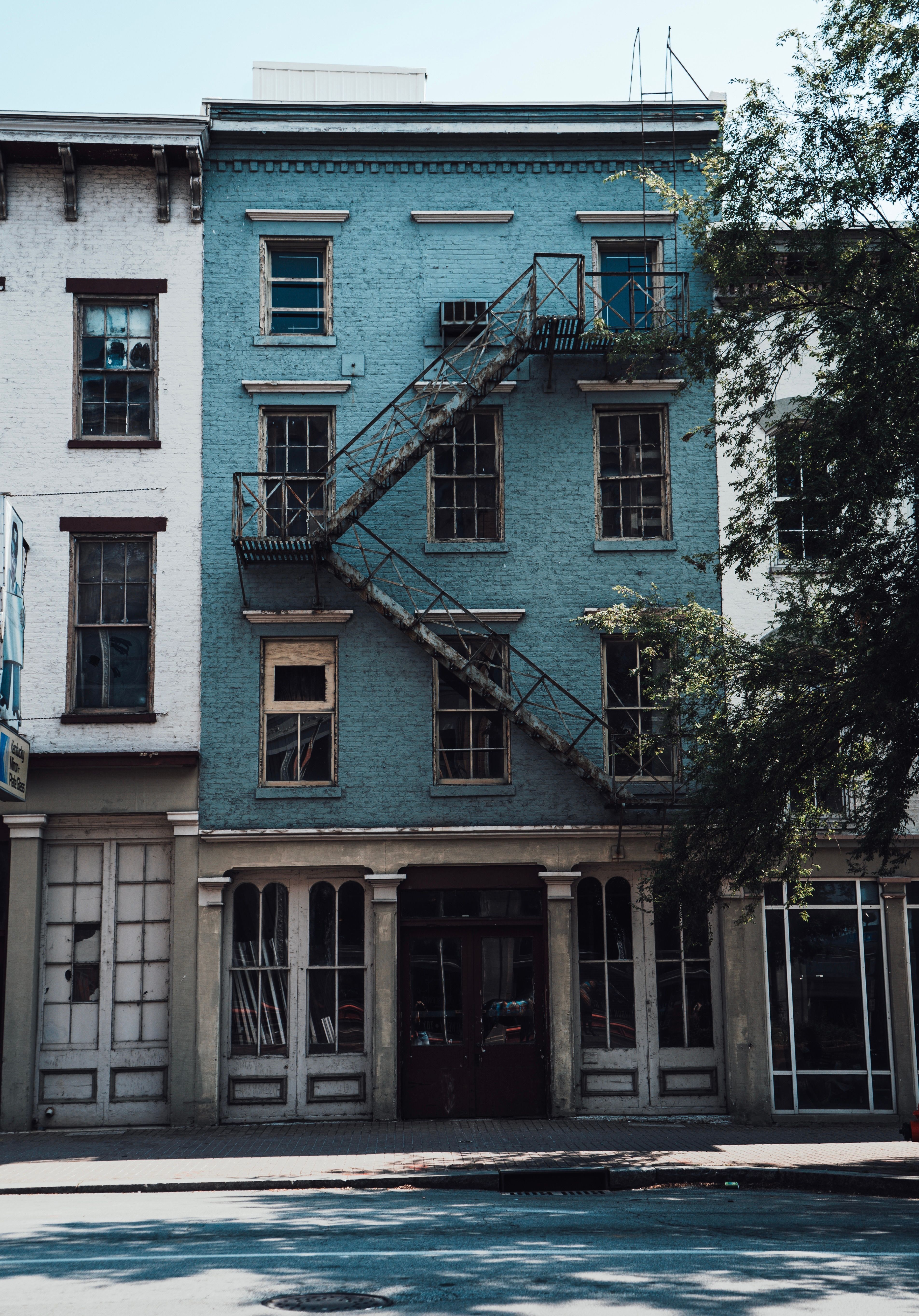 Traditional Townhouse with Fire Escape Stairs · Free Stock Photo