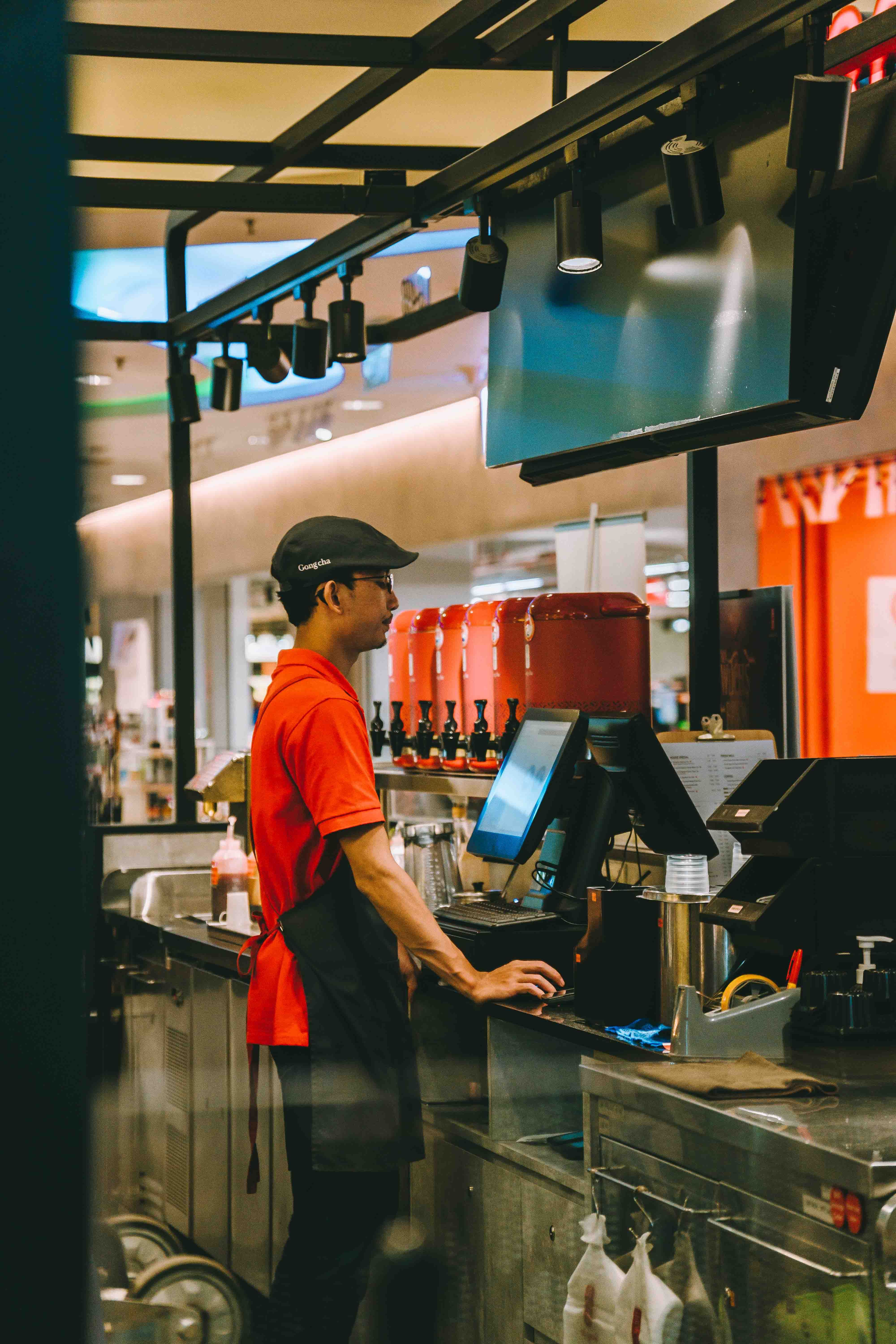 Man in a Fast Food Restaurant · Free Stock Photo
