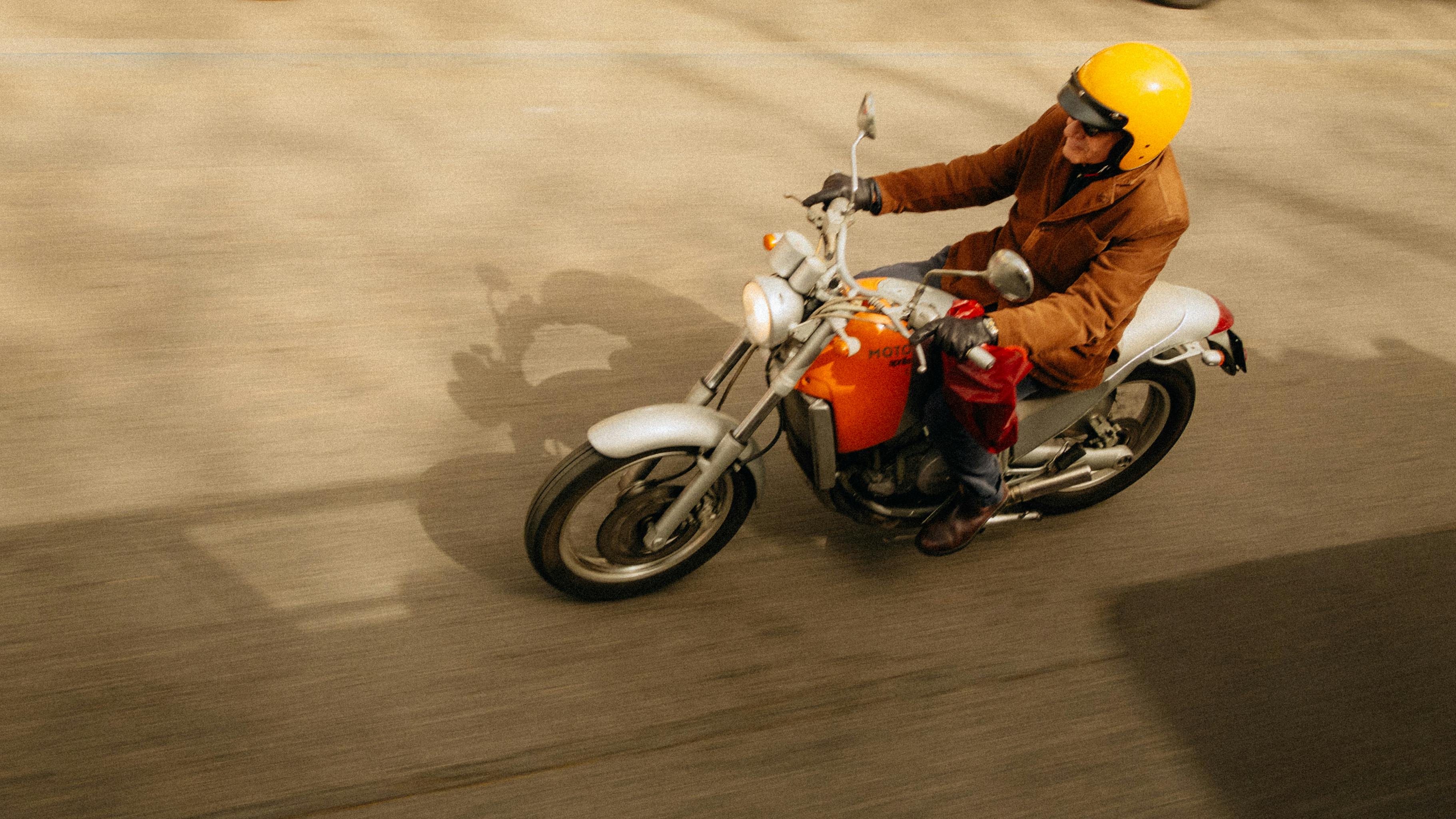 A Man Riding a Motorcycle · Free Stock Photo