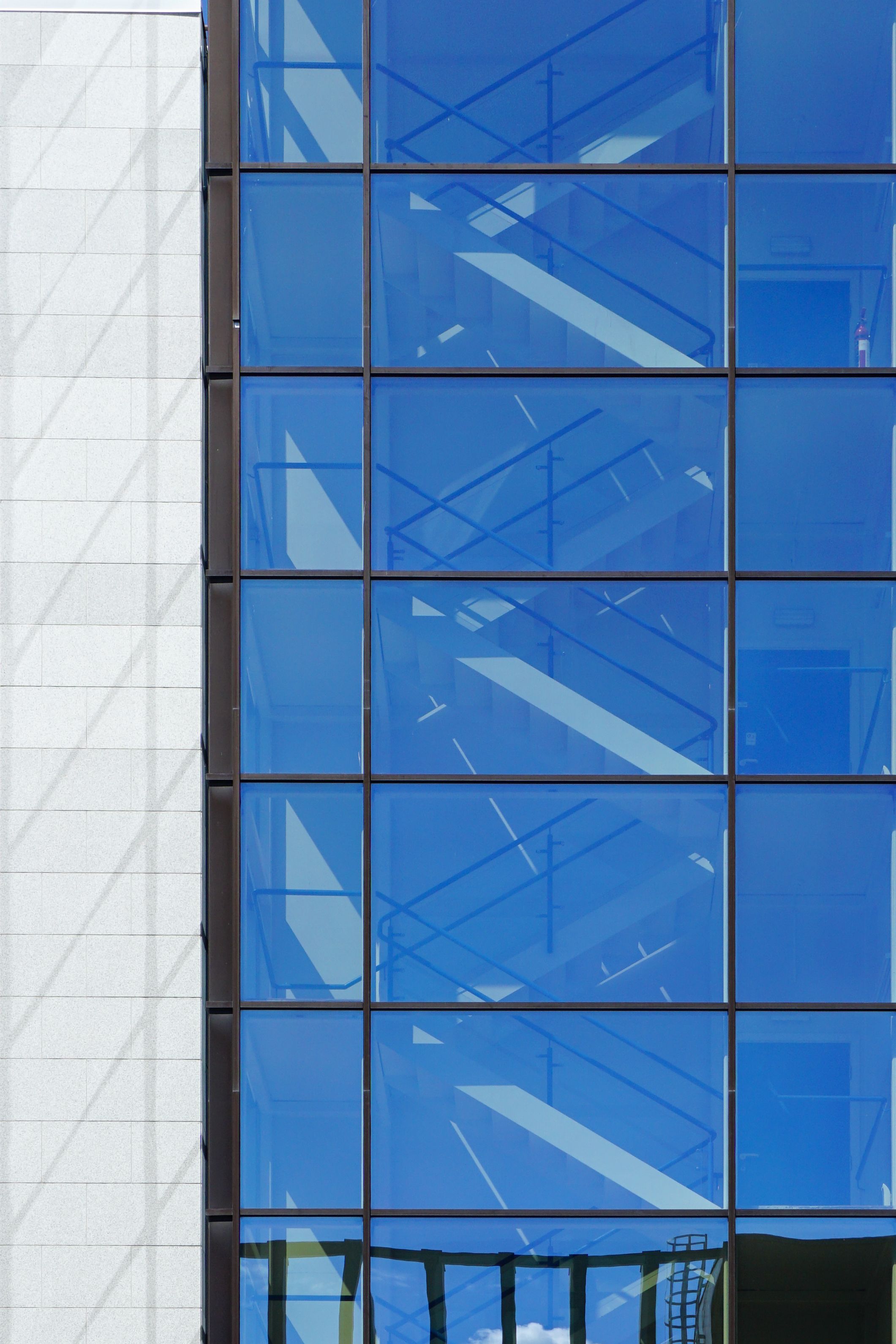 Glass Window of Modern Apartment Building with Staircase Inside · Free ...