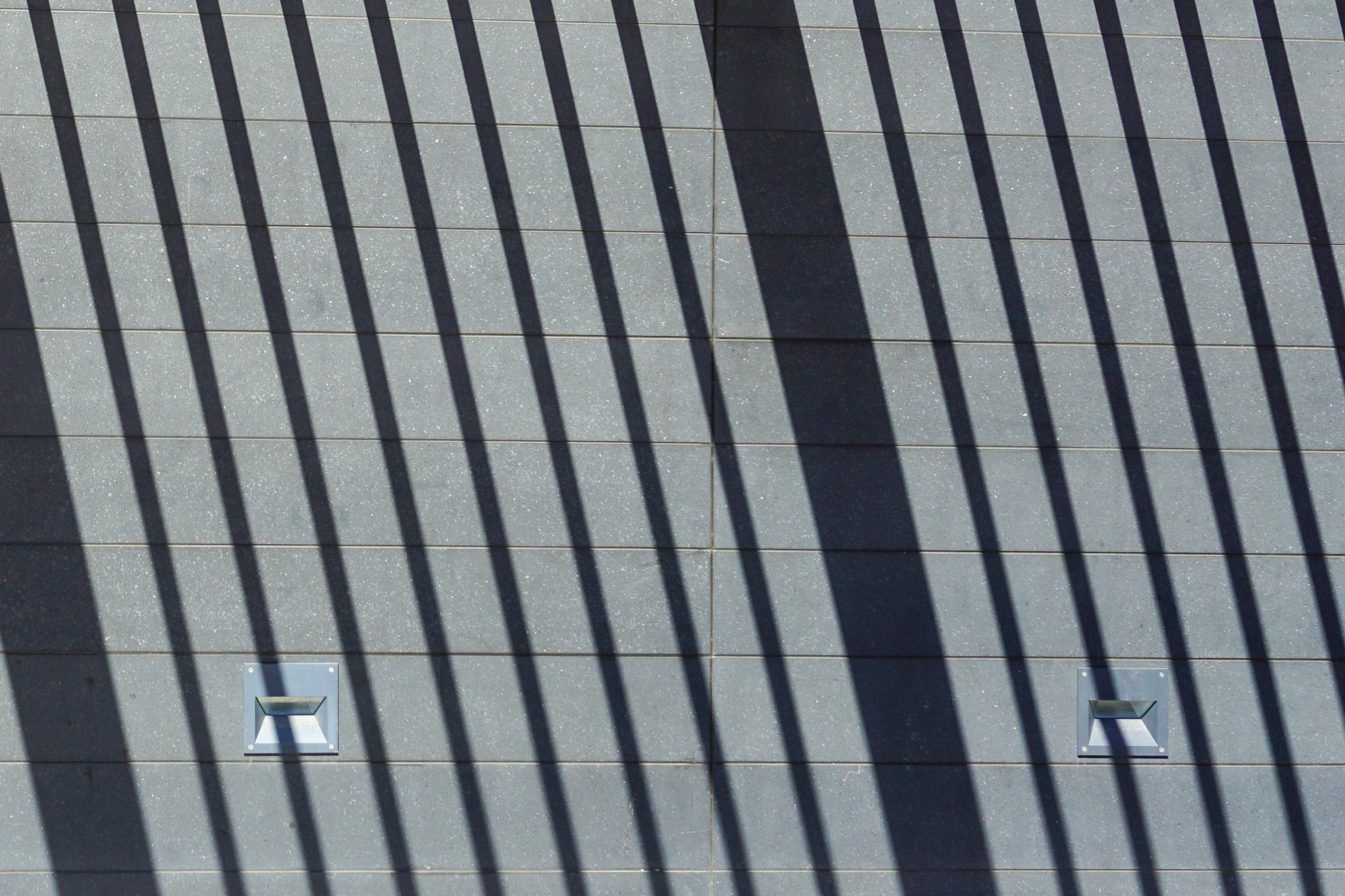 Gray Concrete Building Exterior With Geometric Design · Free Stock Photo