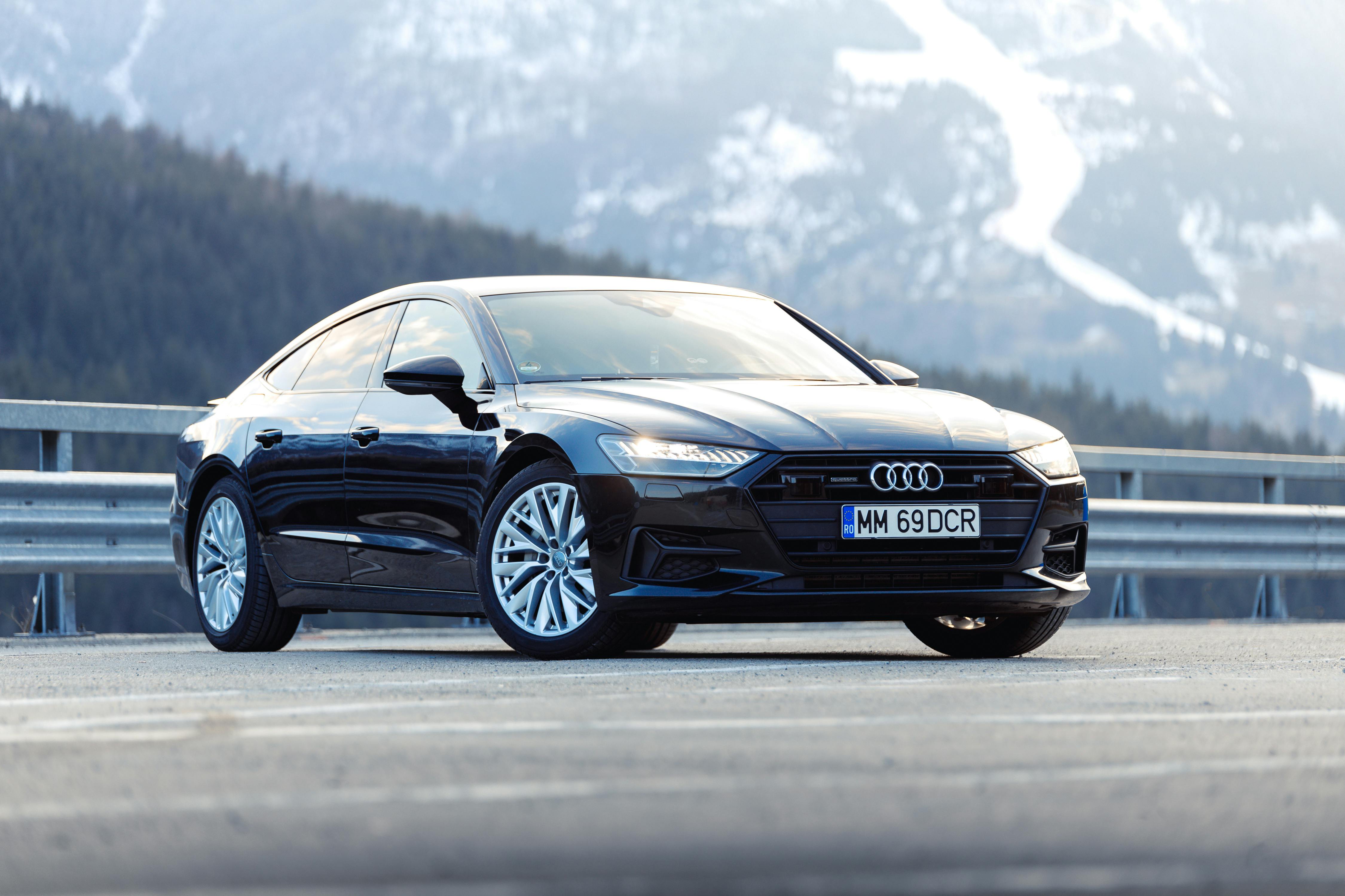 Audi on a Road in Mountain Valley · Free Stock Photo