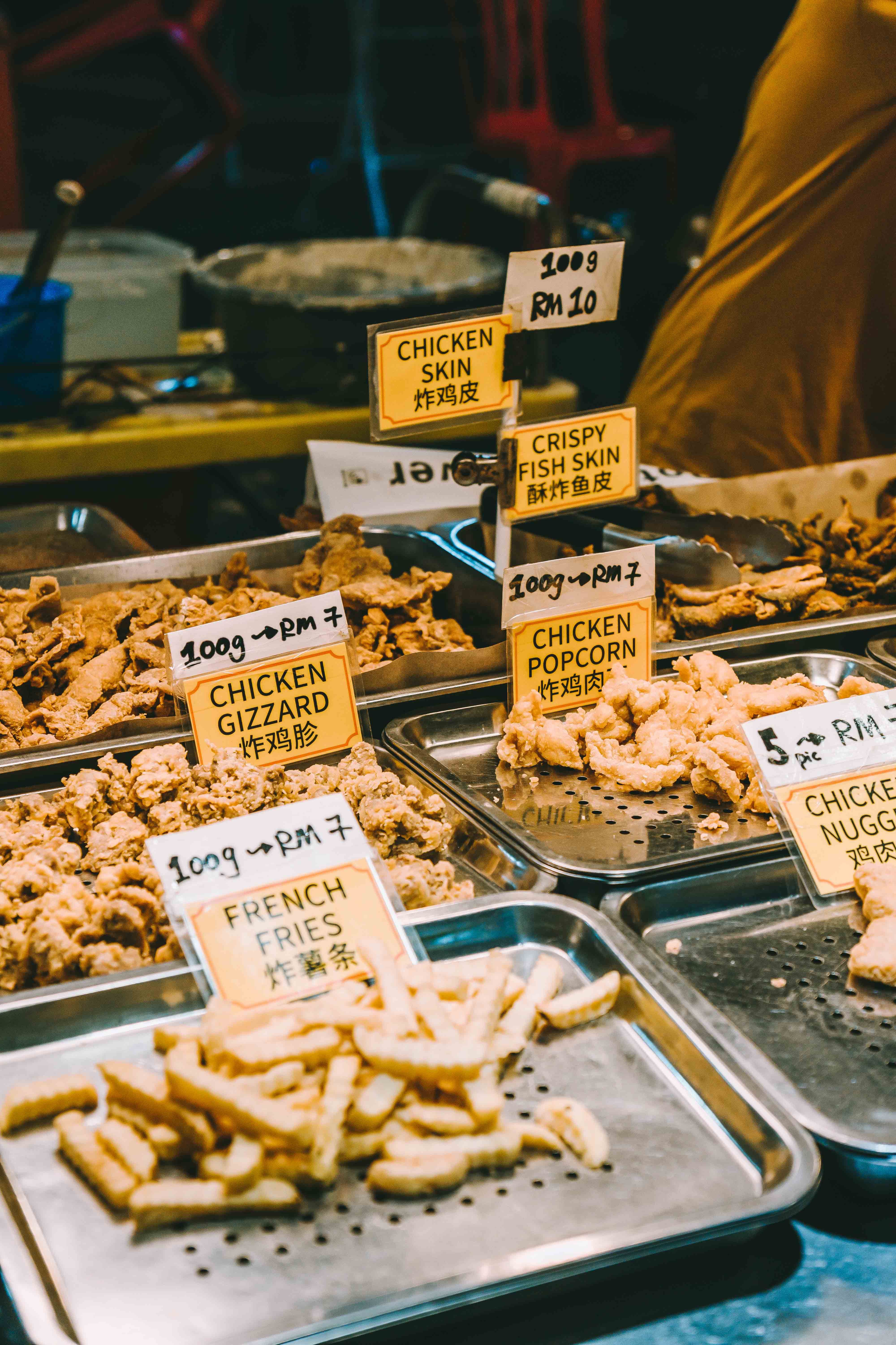 Japanese Street Food Booth Offering Fried Chicken · Free Stock Photo