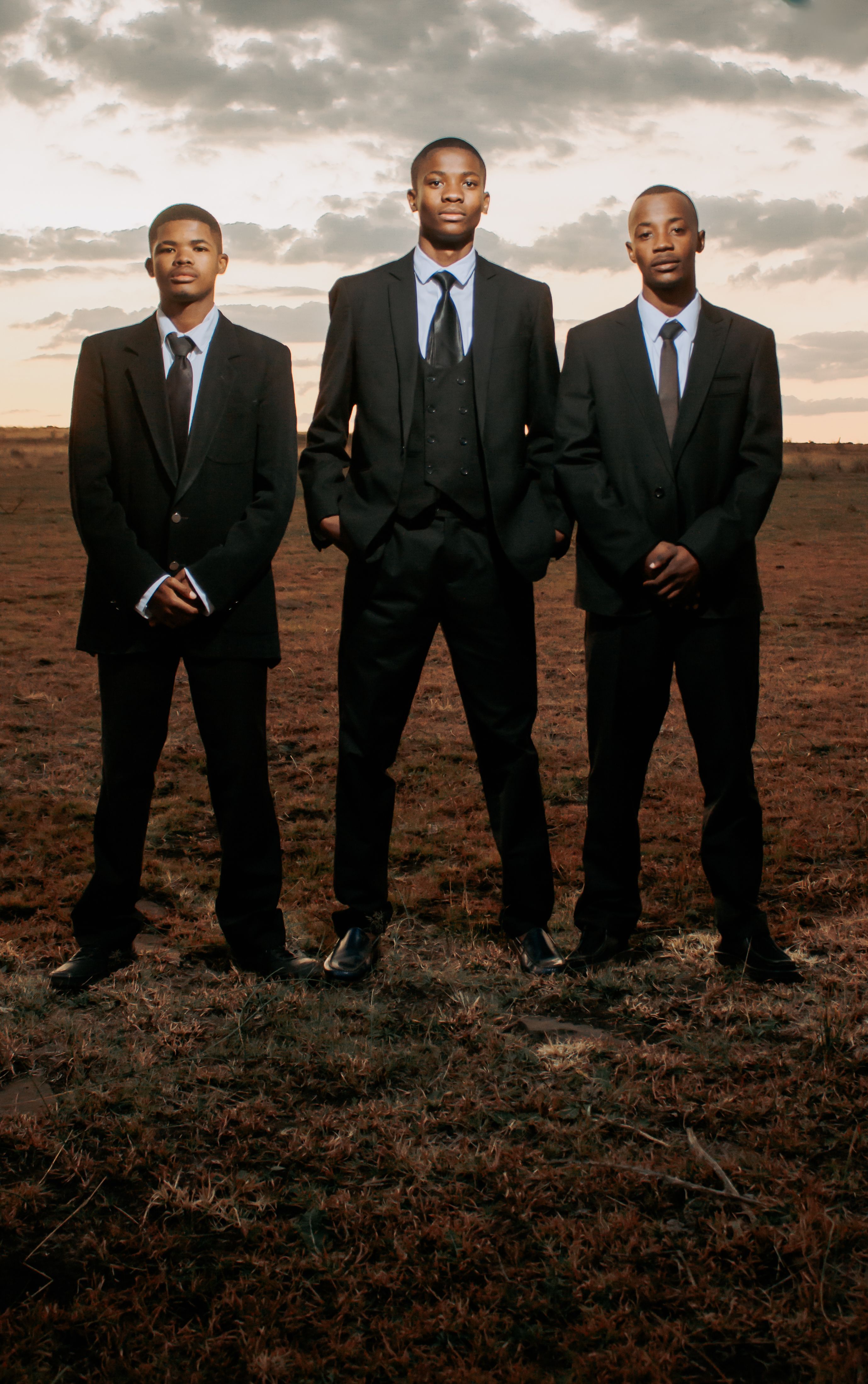 Elegant Men on a Field · Free Stock Photo