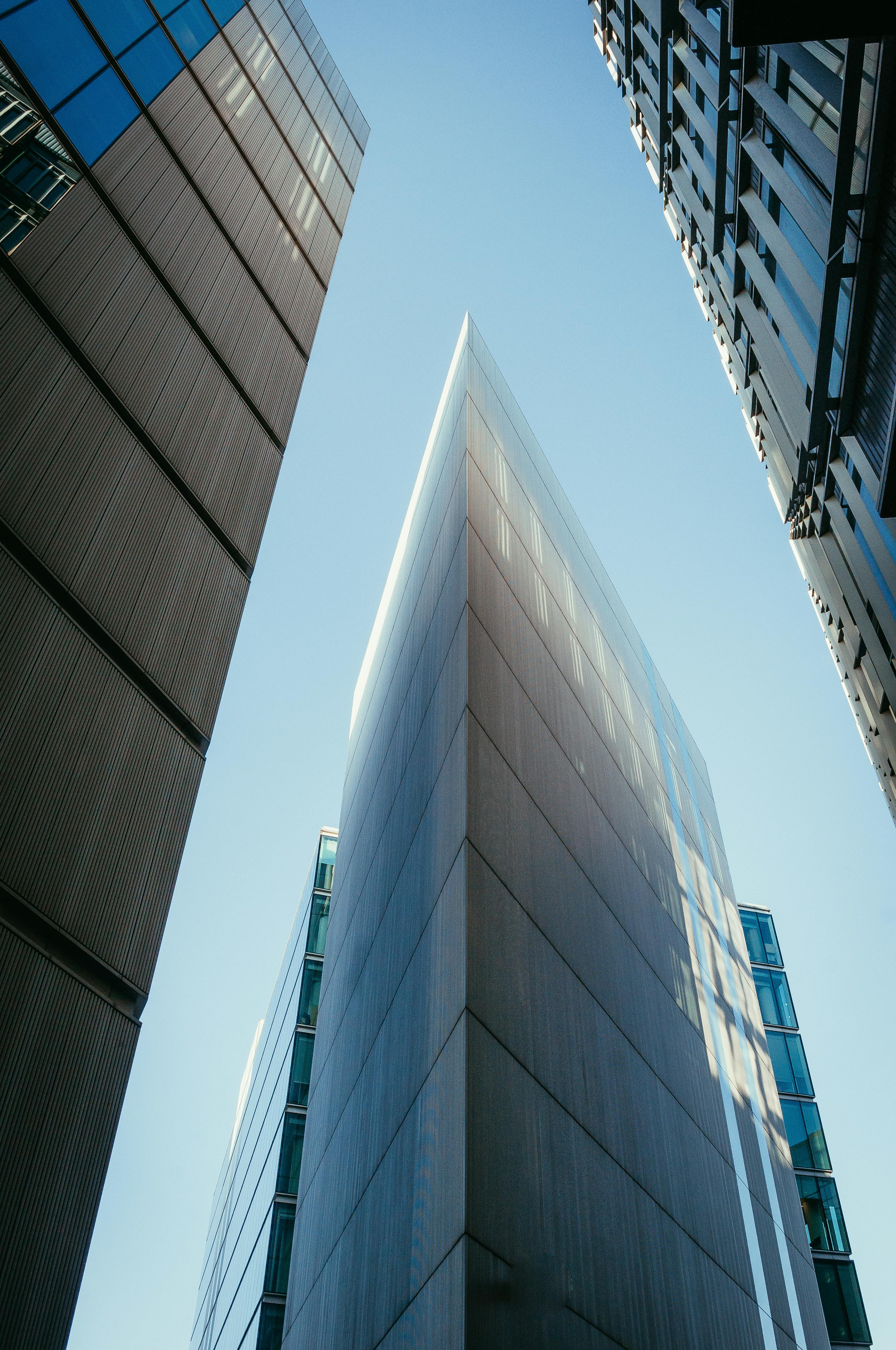 High Rise Buildings Under Clear Skies · Free Stock Photo