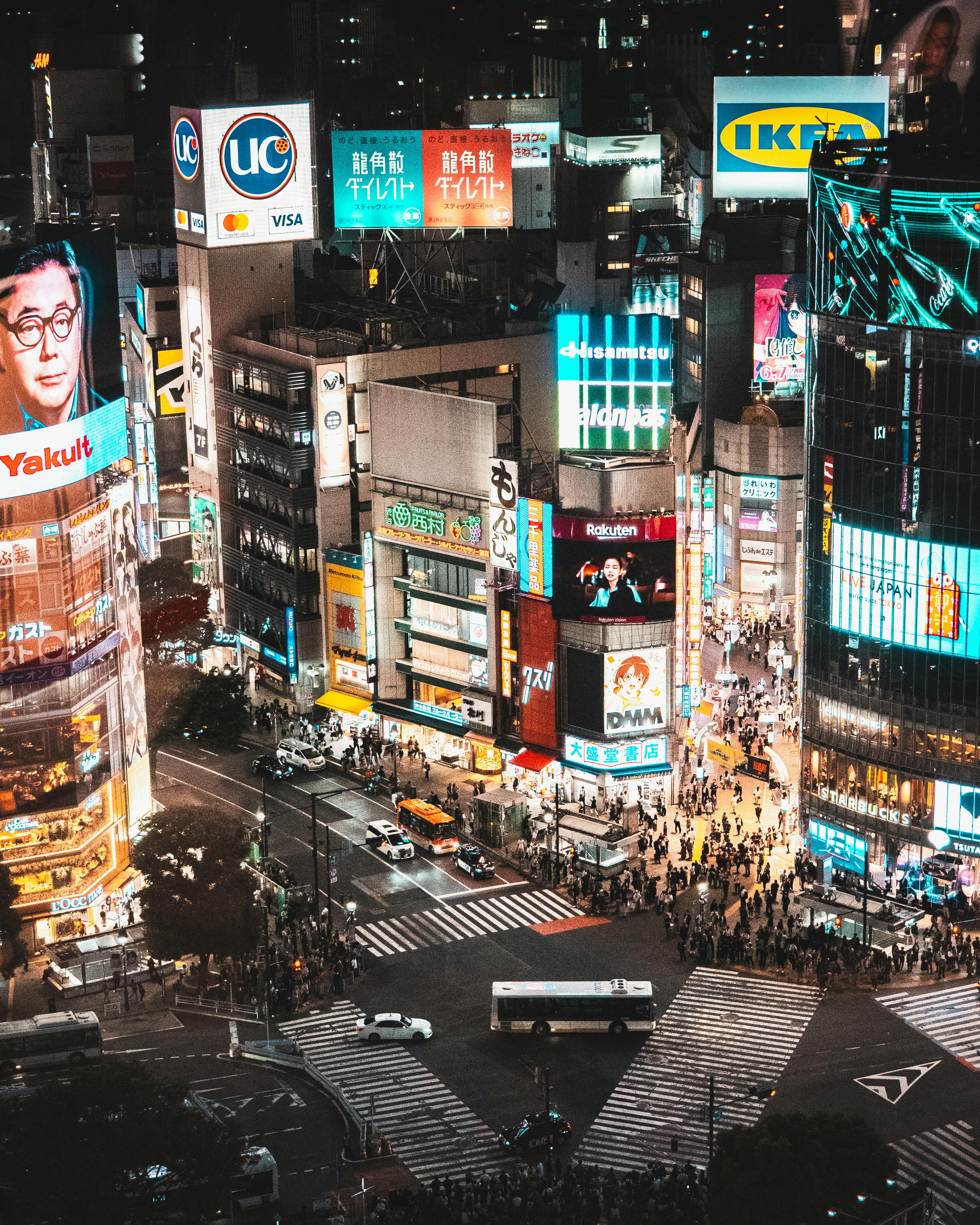 People Walking On The Streets Surrounded By Buildings · Free Stock Photo
