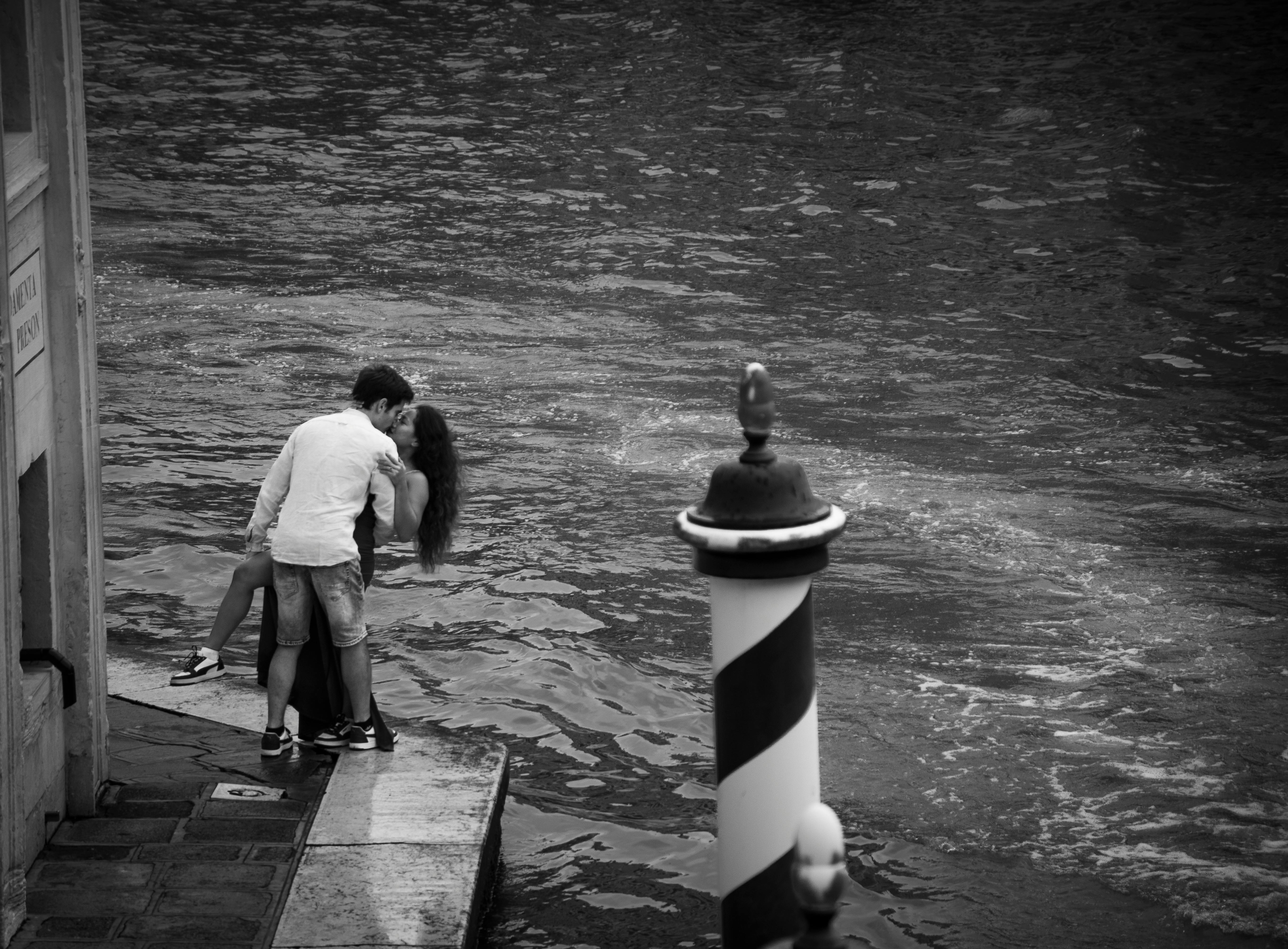 Couple Kissing on a Pier · Free Stock Photo