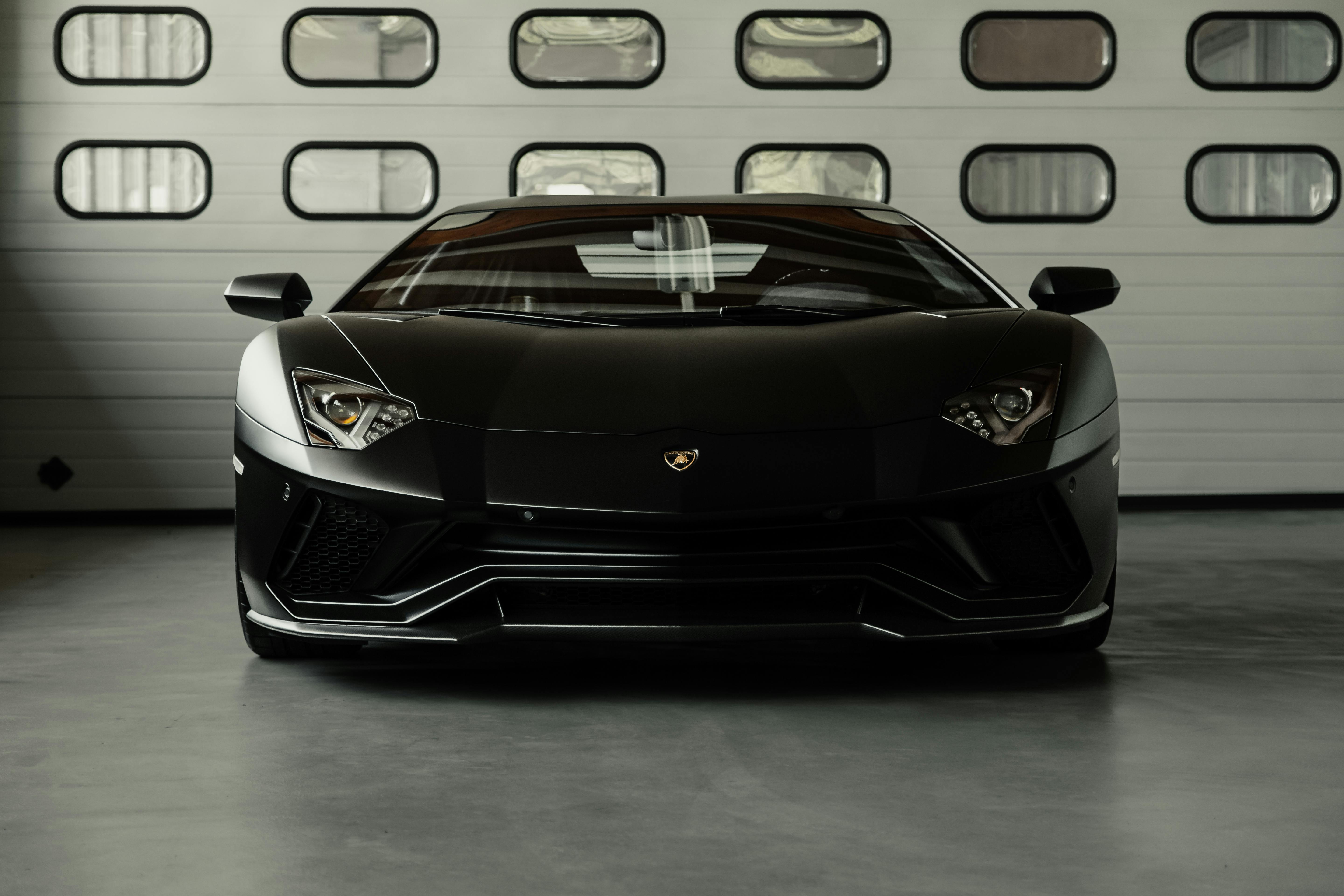 Black Luxury Car in Showroom · Free Stock Photo