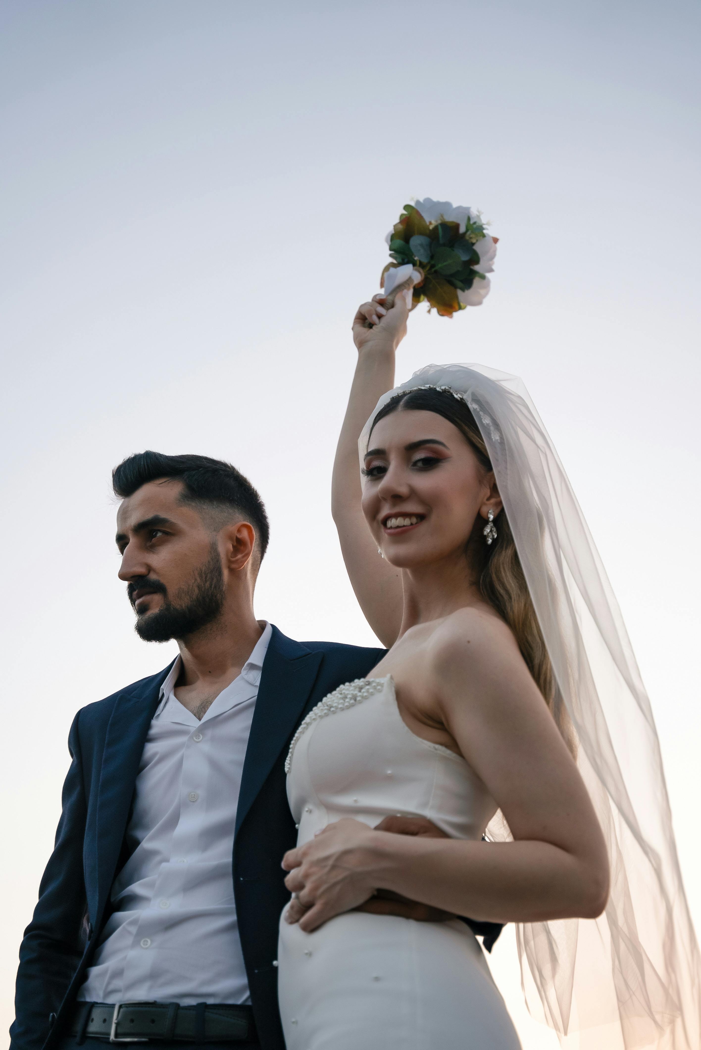 Cheerful Weeding Couple · Free Stock Photo