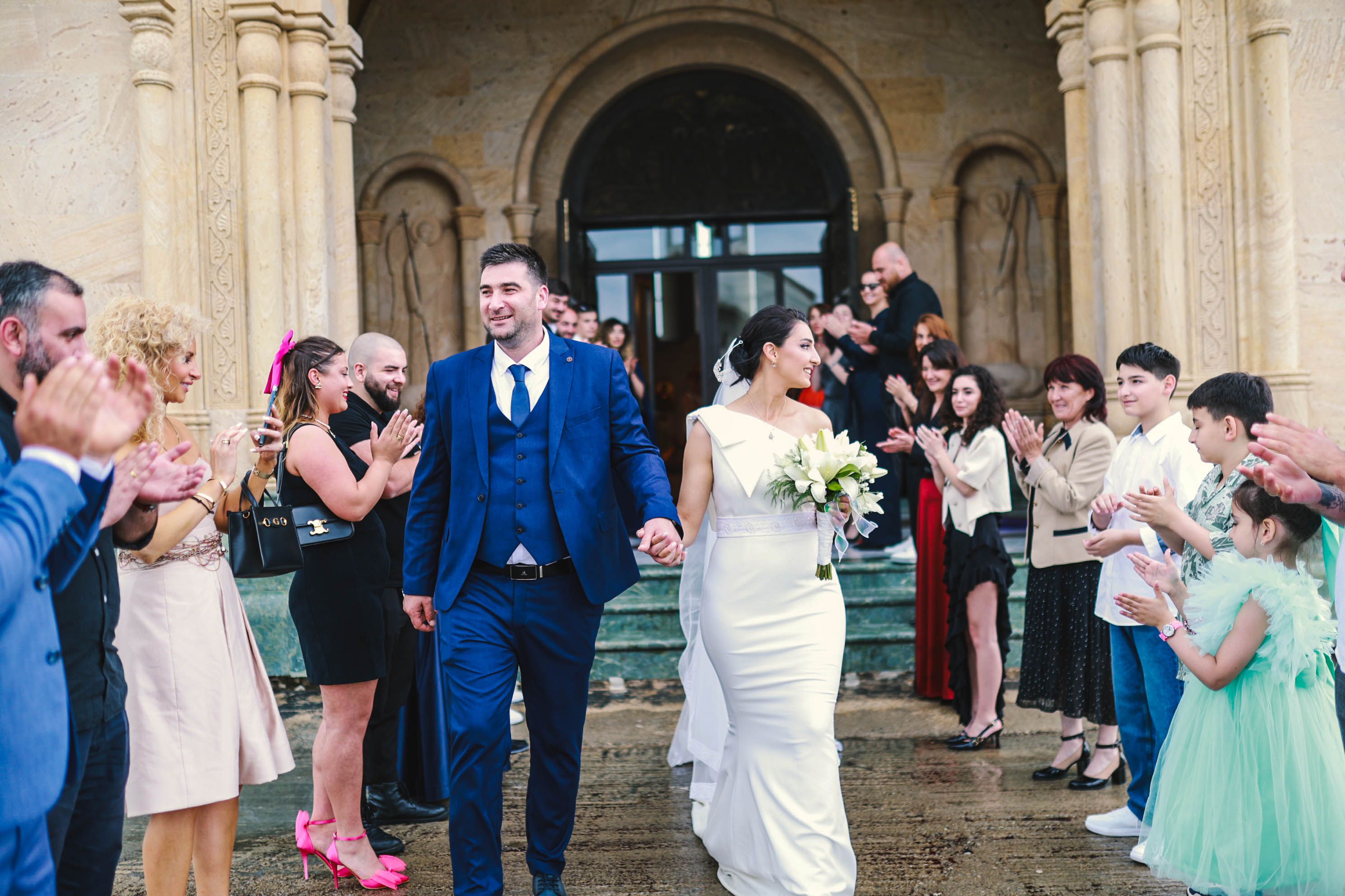 Newlyweds Walking among Guests after Wedding · Free Stock Photo