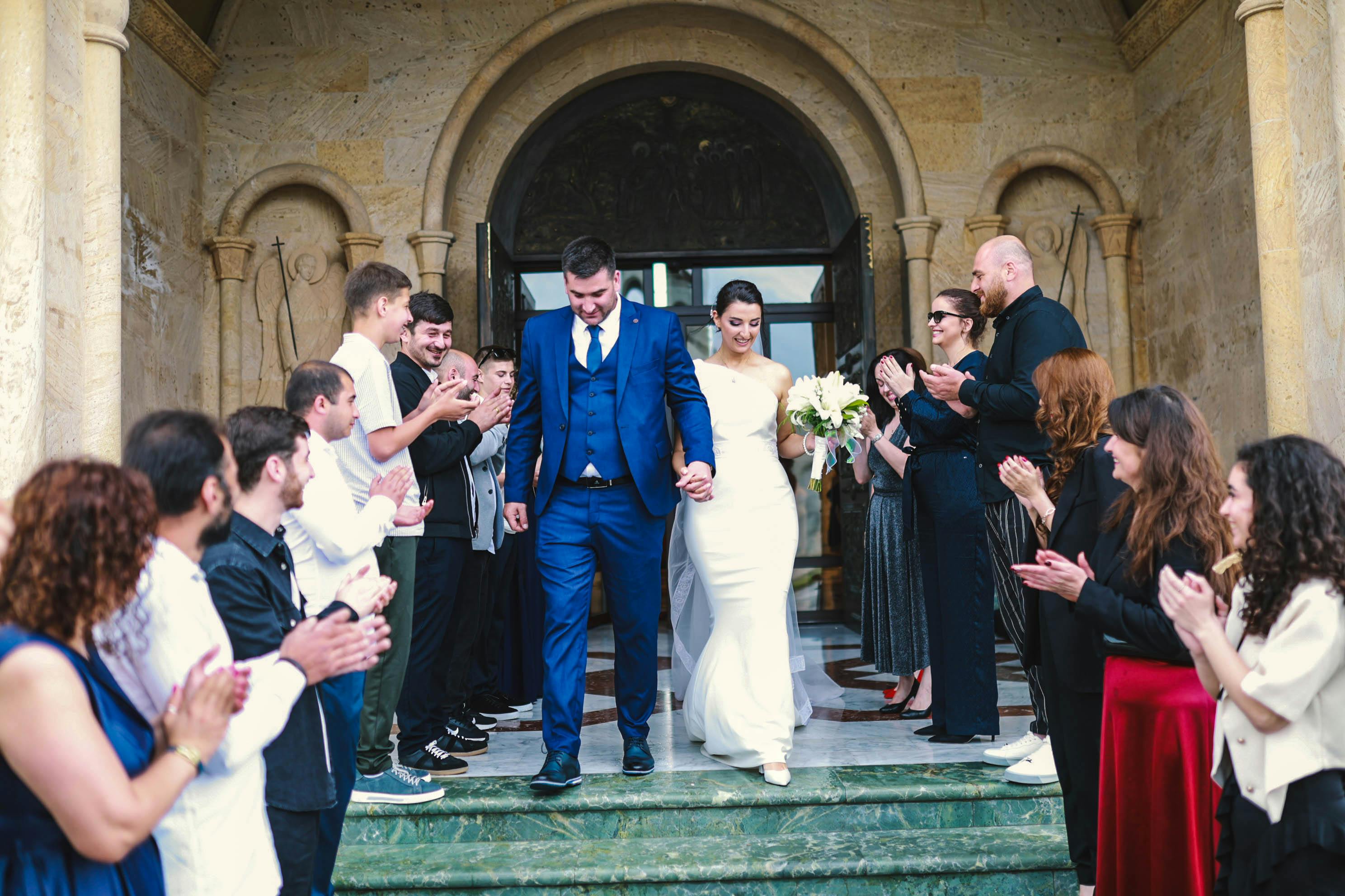 The Bride and Groom Walking Out of the Church · Free Stock Photo