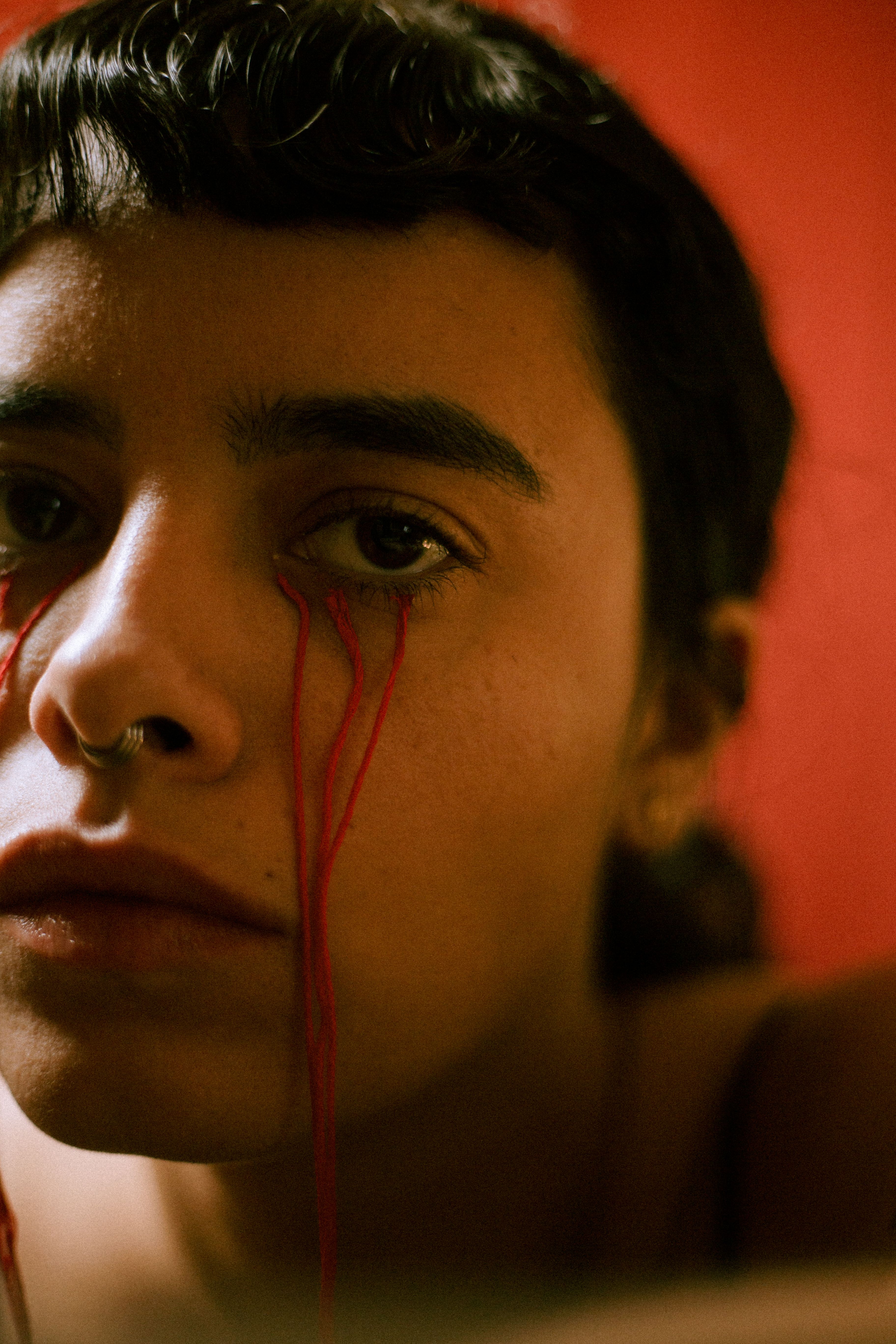 A woman with blood on her face · Free Stock Photo