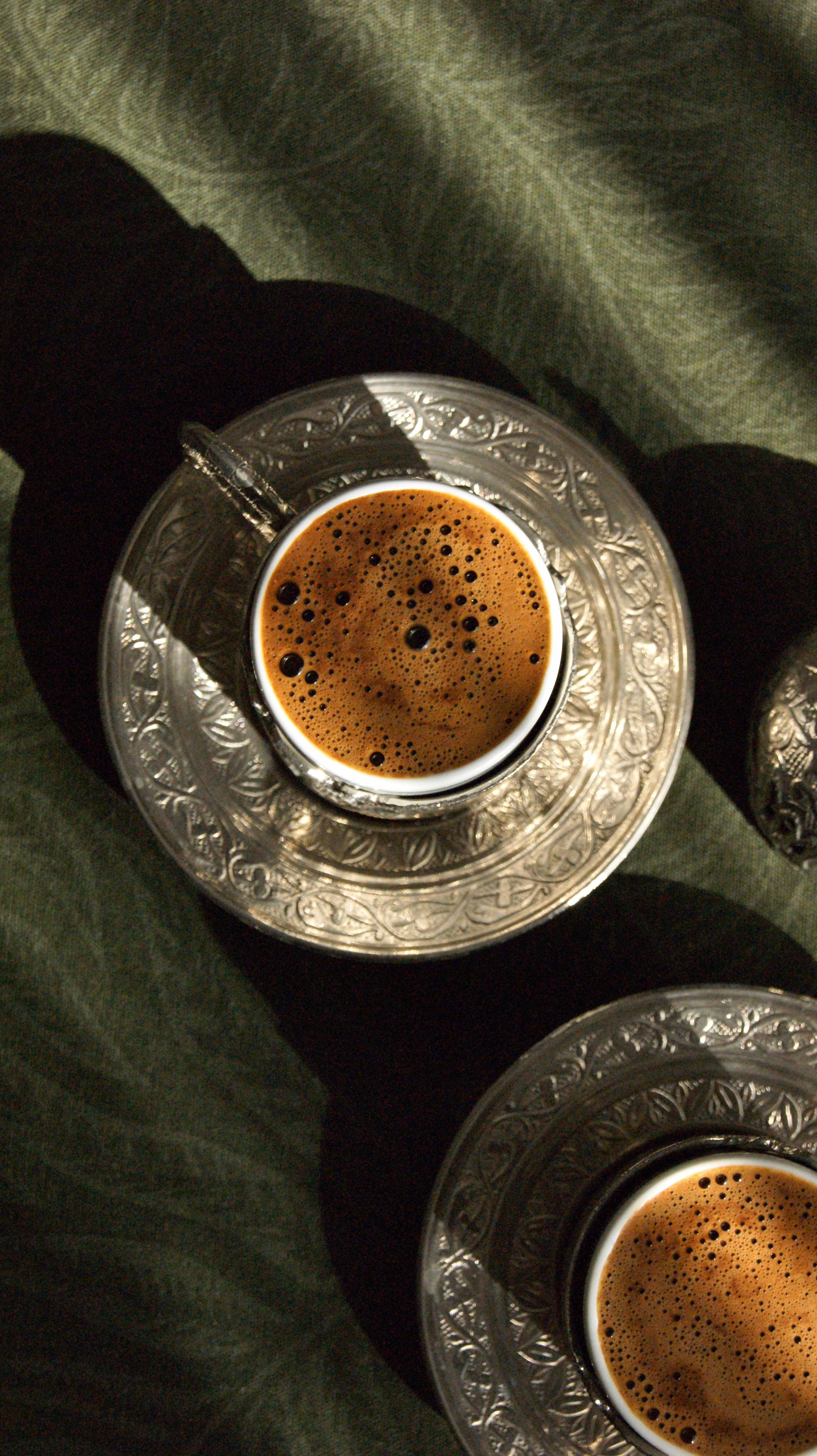 Elegant Espresso Cup in Sunlight · Free Stock Photo
