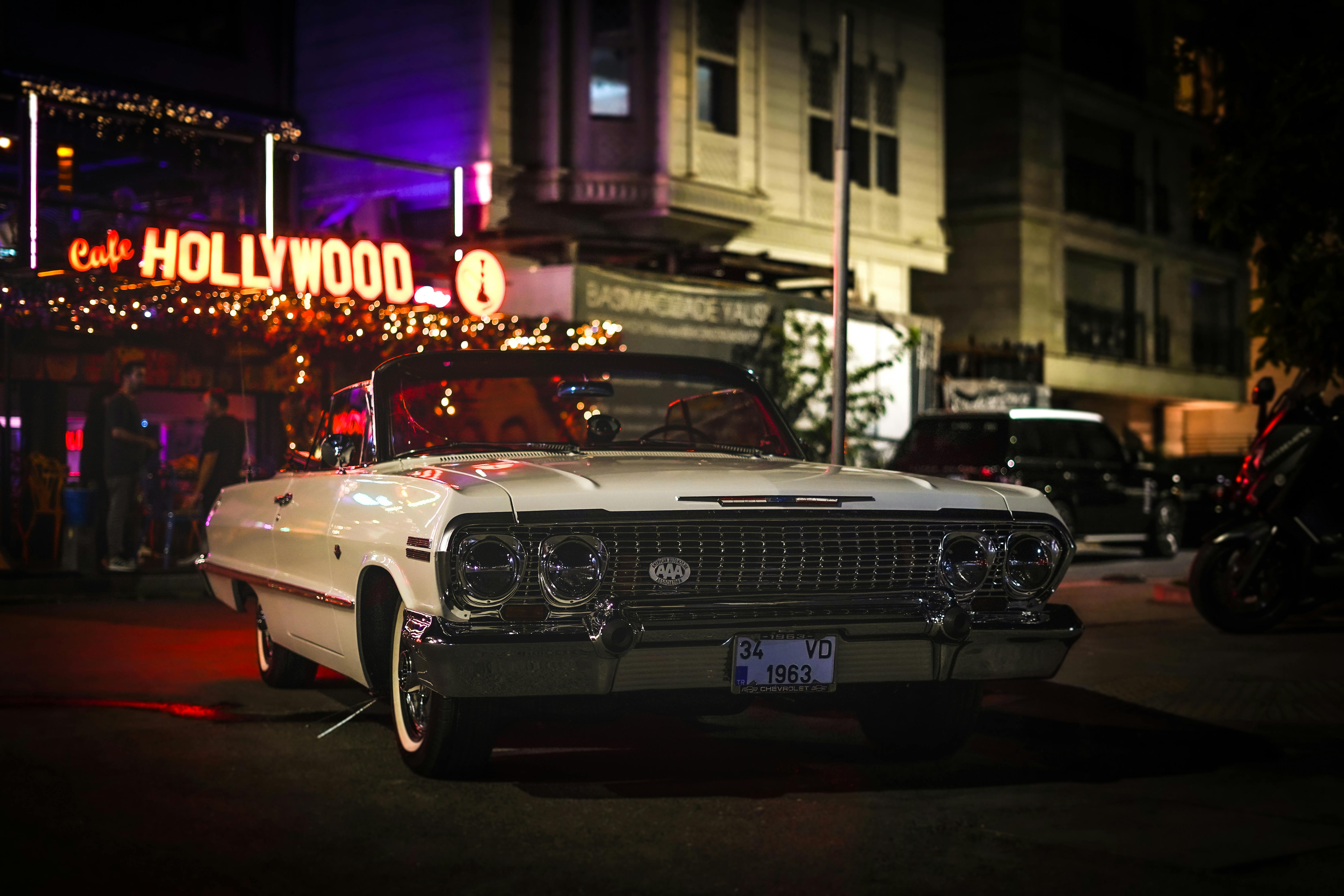Cadillac on a Street at Night · Free Stock Photo