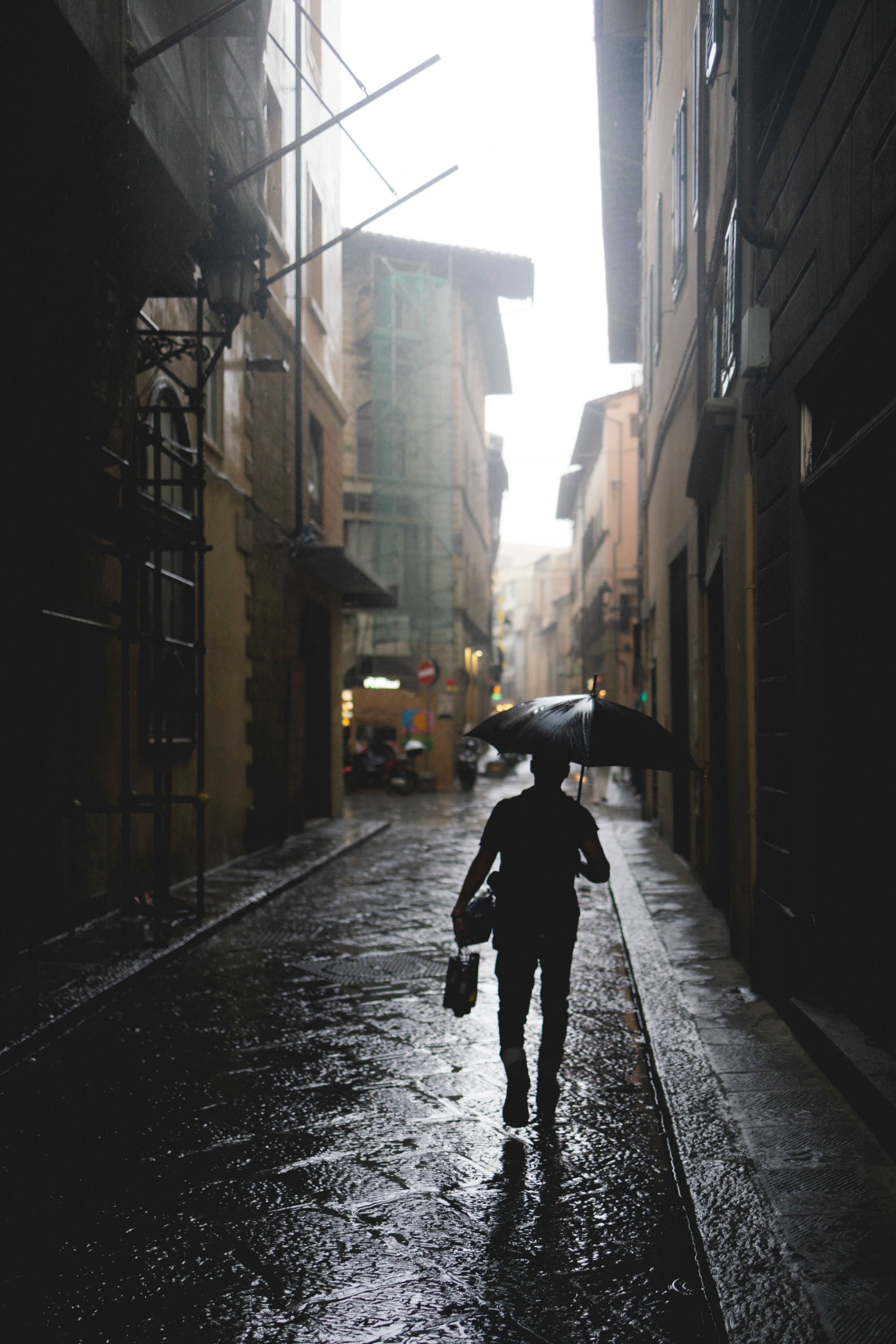 Person Walking with Umbrella on Street in City in Rain · Free Stock Photo