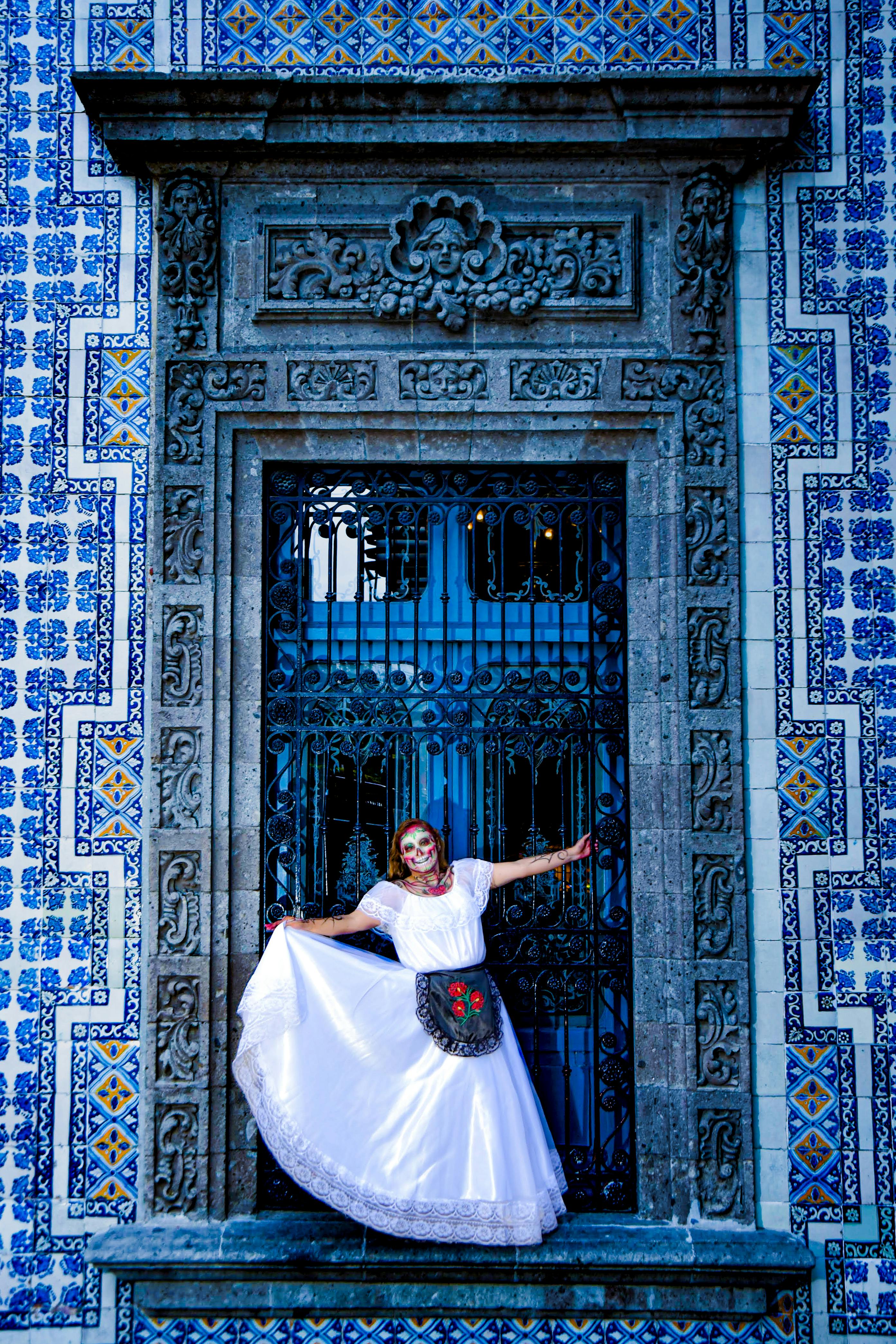 Woman Standing in Dress in front of Window · Free Stock Photo