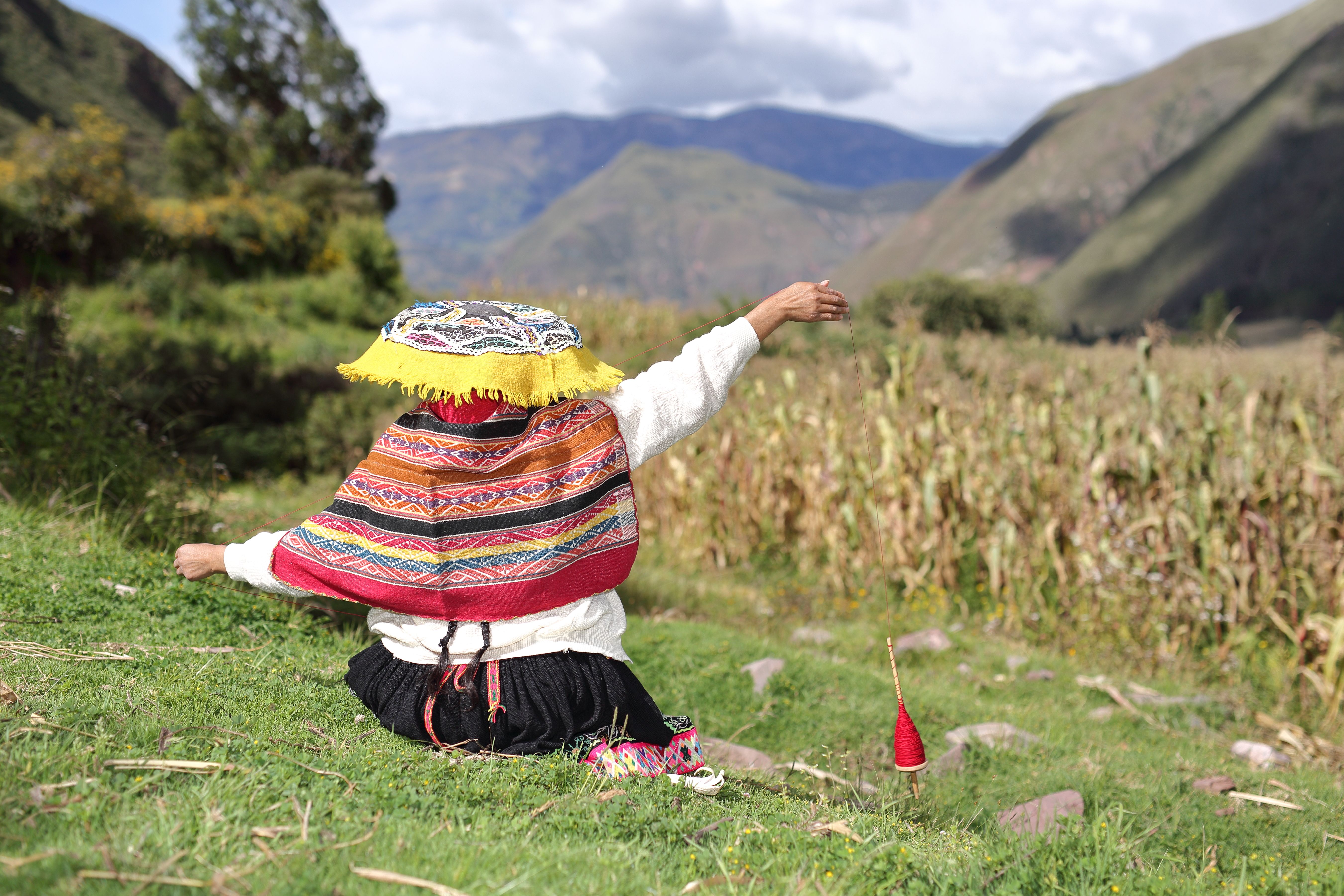 Peruvian women with traditional clothes near Andahuaylillas, Cusco ...
