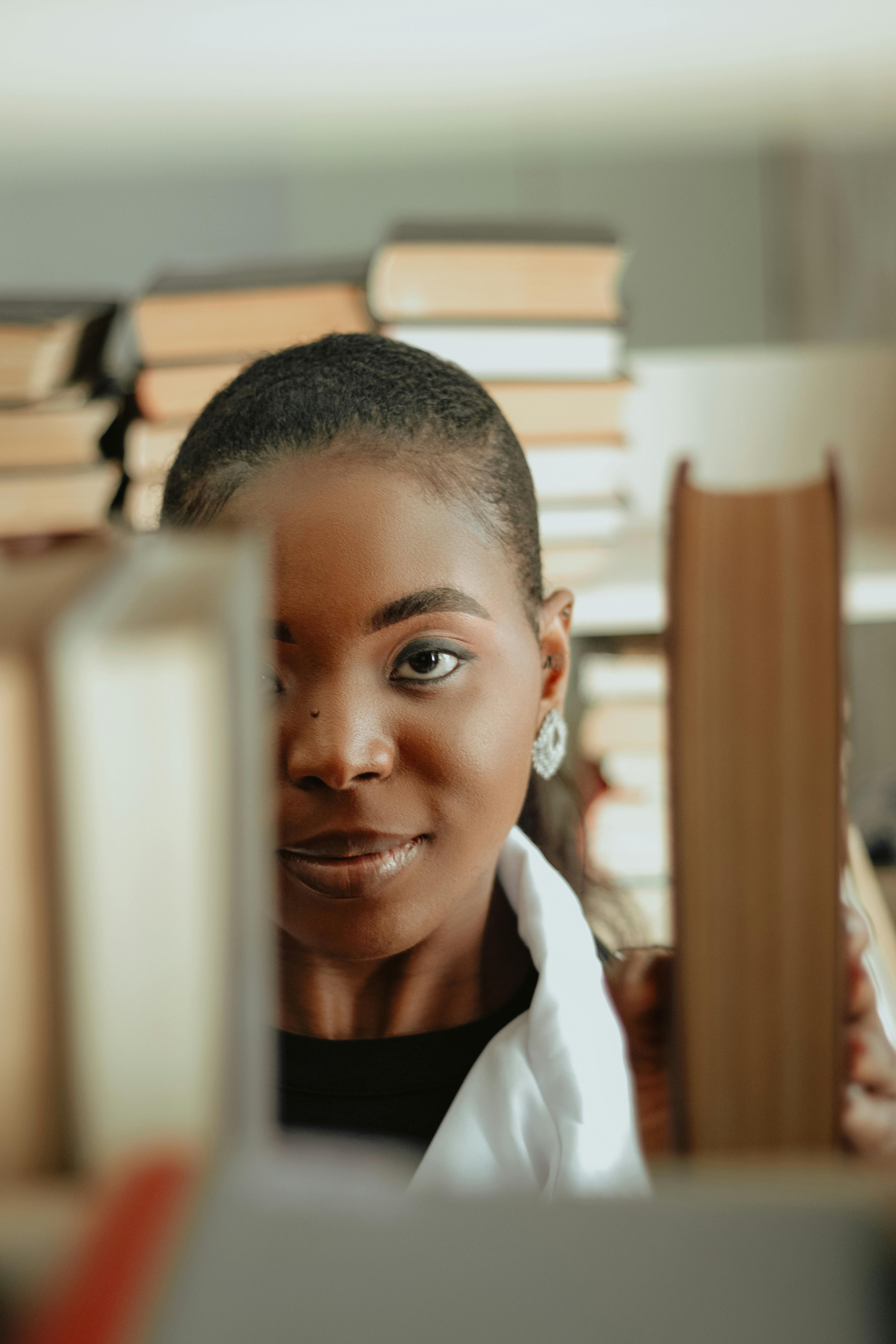 Woman Face behind Books · Free Stock Photo