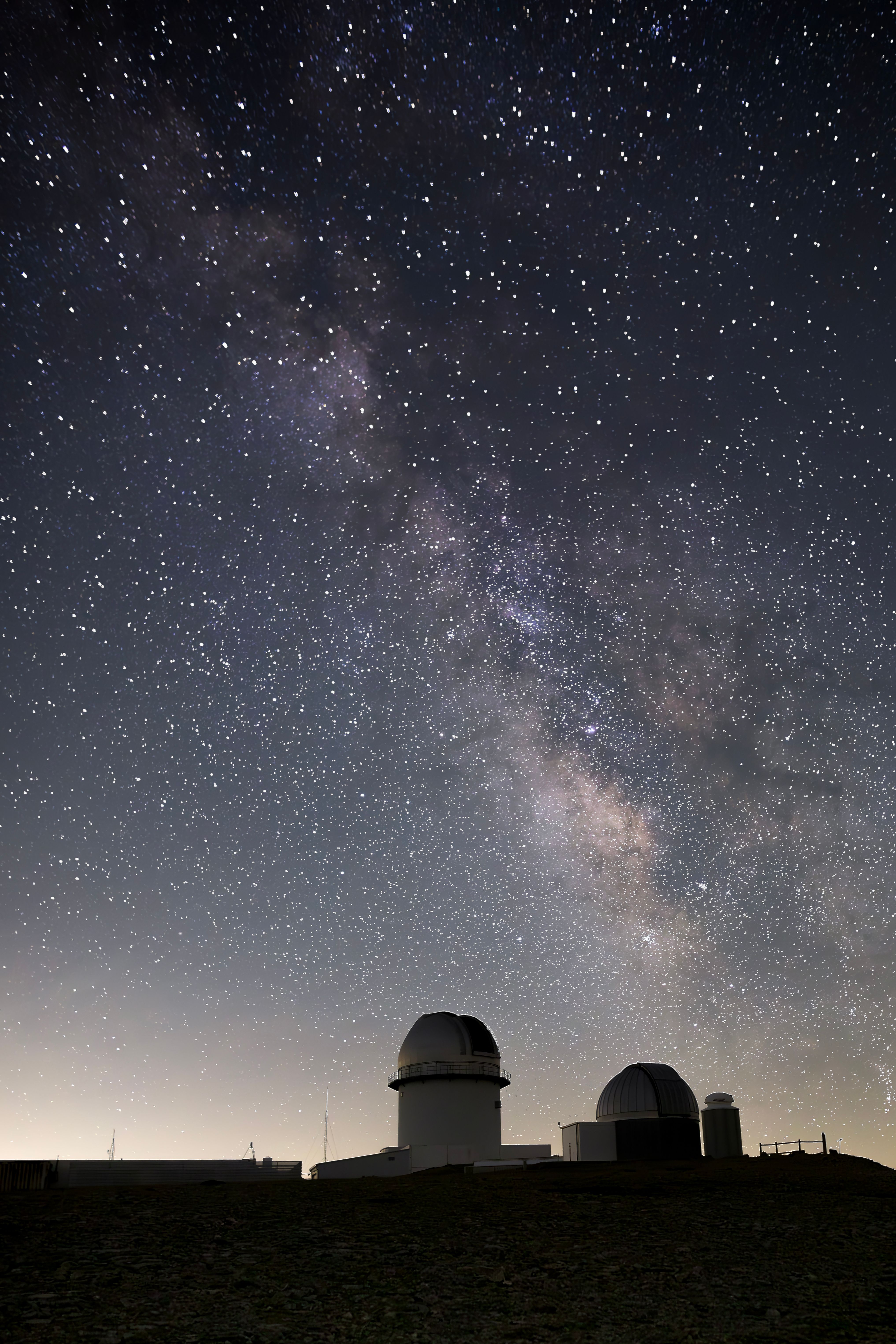 Stars in Night Sky over Observatory Buildings · Free Stock Photo